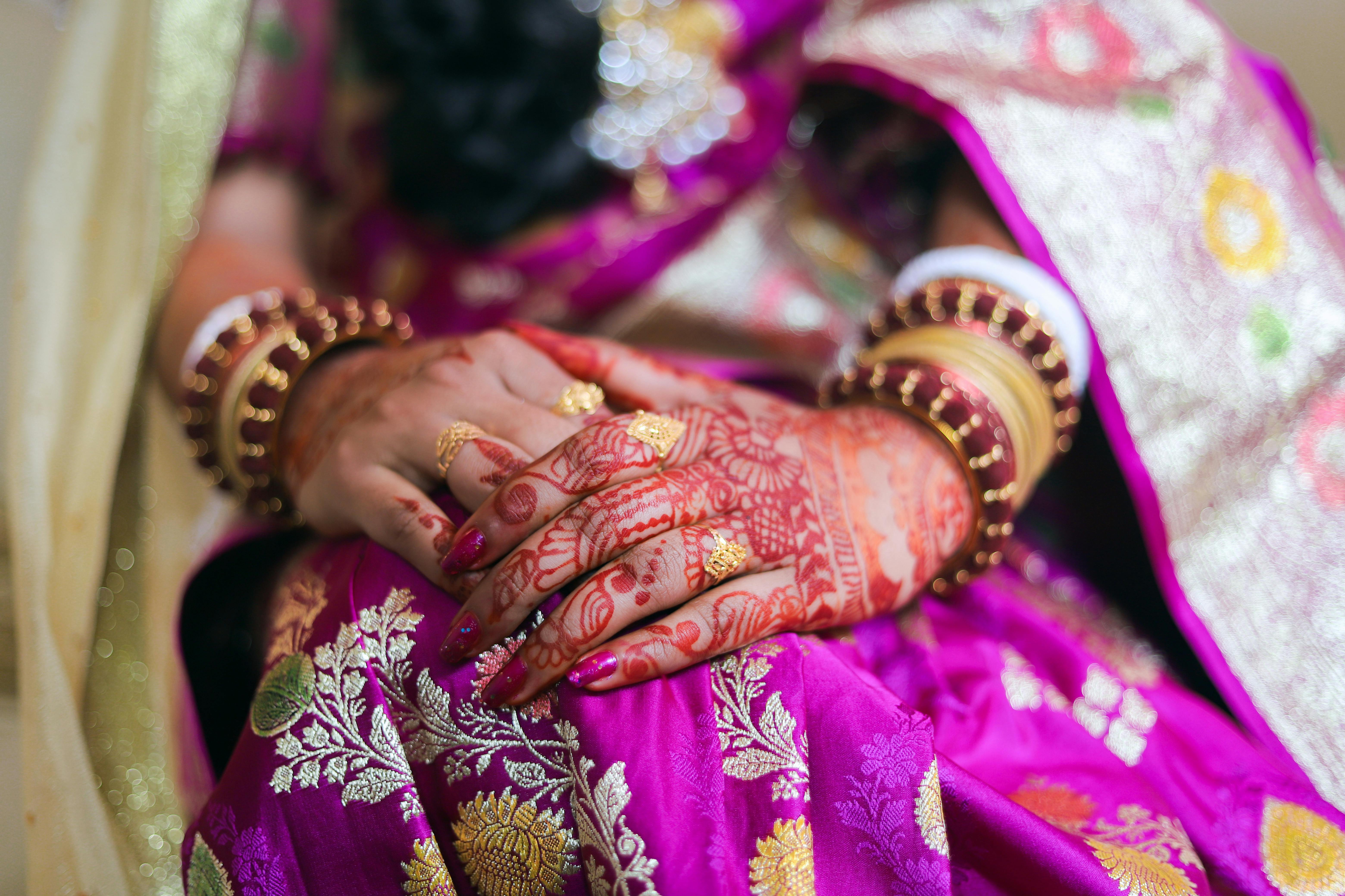 A close up of a woman's hands with henna · Free Stock Photo