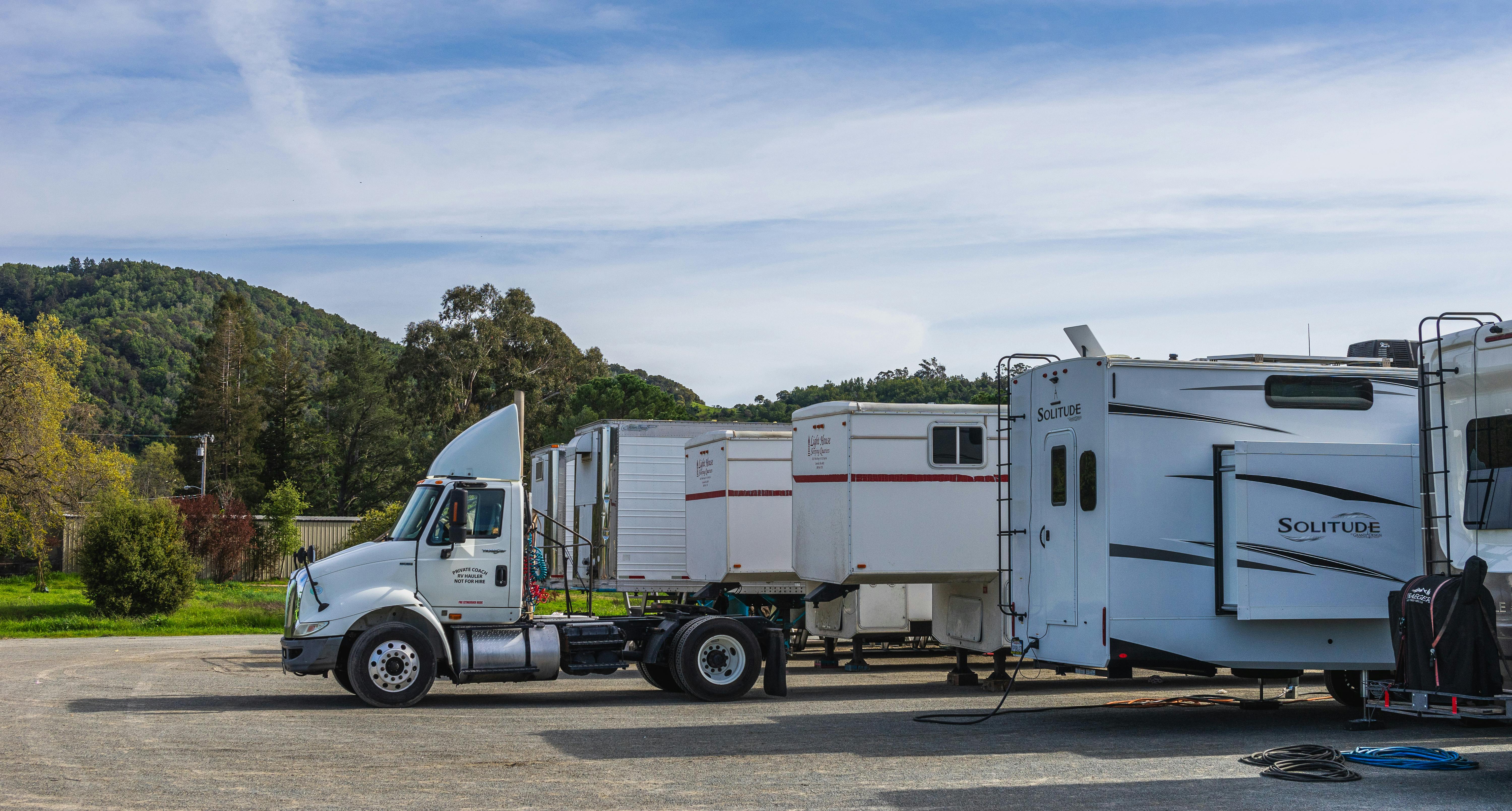 Truck and Trailers on a Car Park in a Countryside · Free Stock Photo