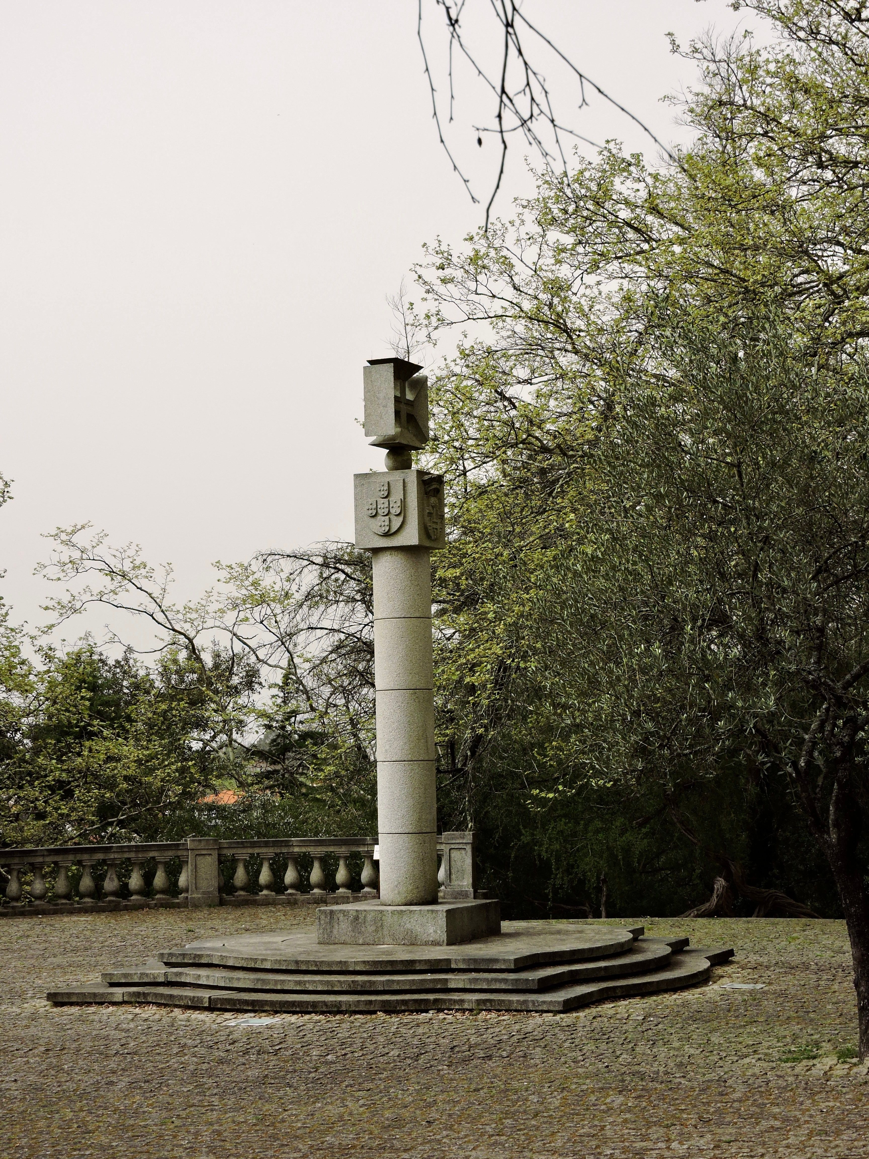 A monument with a cross on top of it · Free Stock Photo