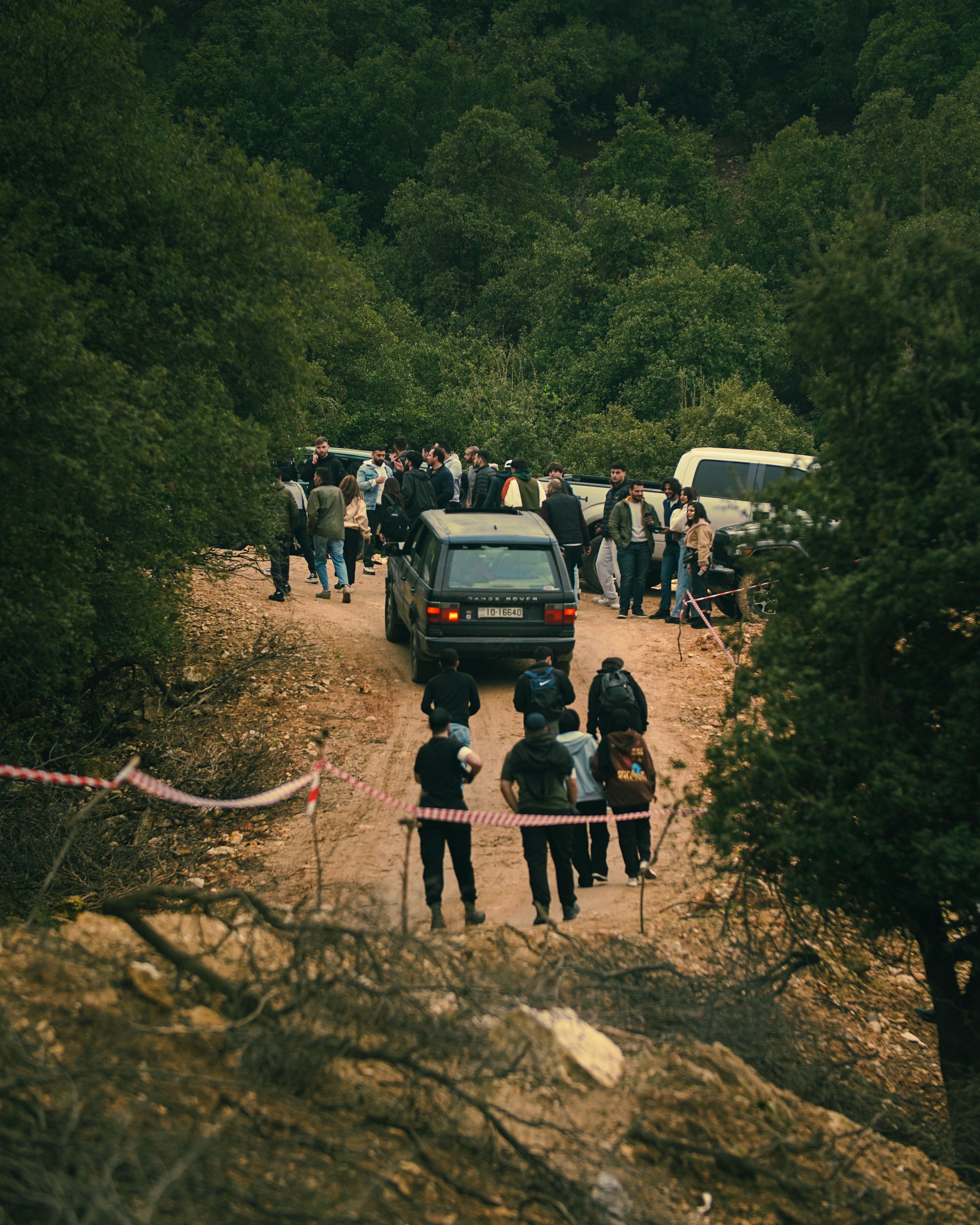 A Group of People and Cars in a Rural Area · Free Stock Photo