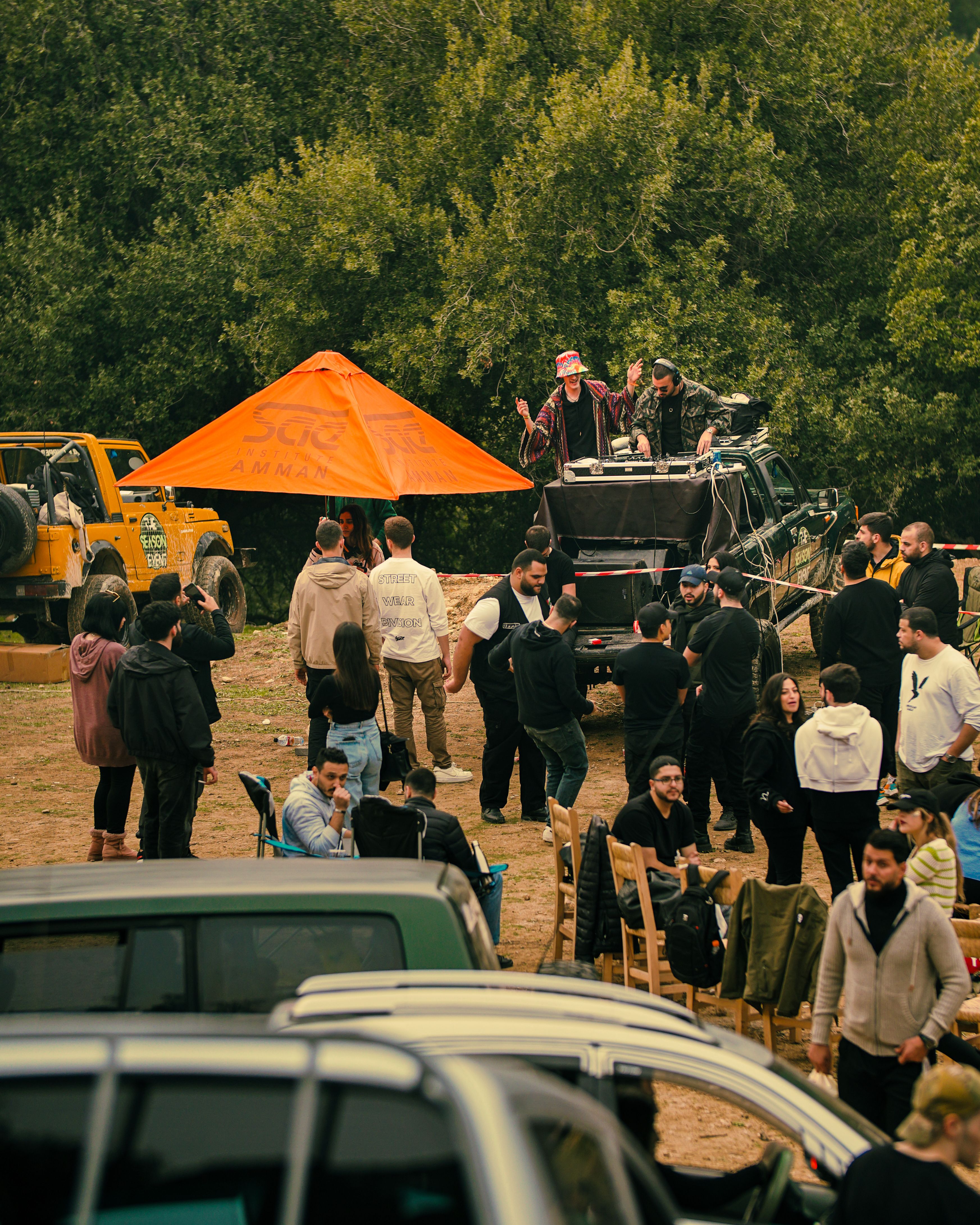 People at Offroad Event in Forest · Free Stock Photo