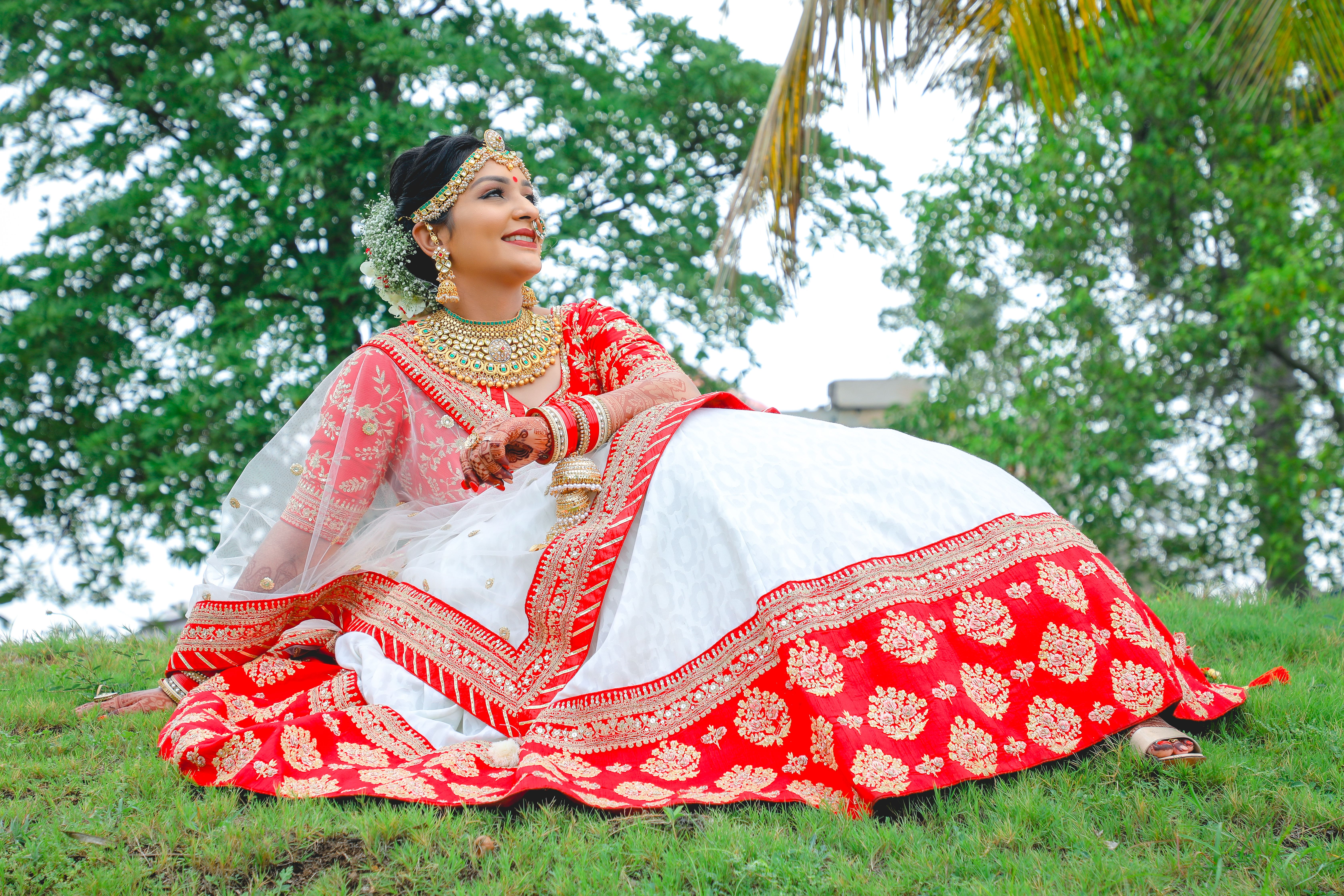 Photo of a Bride Wearing Traditional Lehenga Dress and Jewelry Posing ...