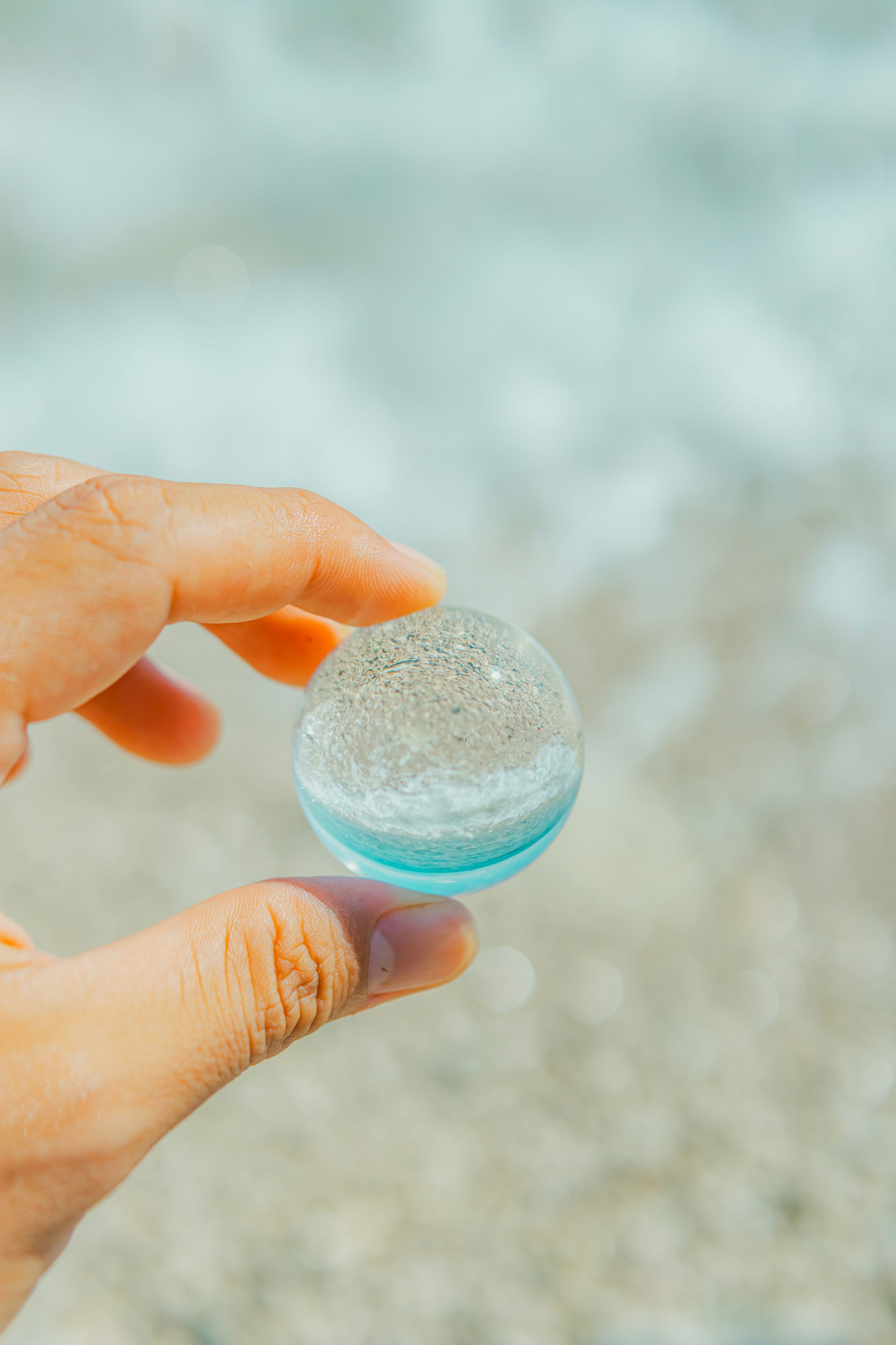 Photo Displays Person Holding Ball With Reflection of Horizon · Free ...