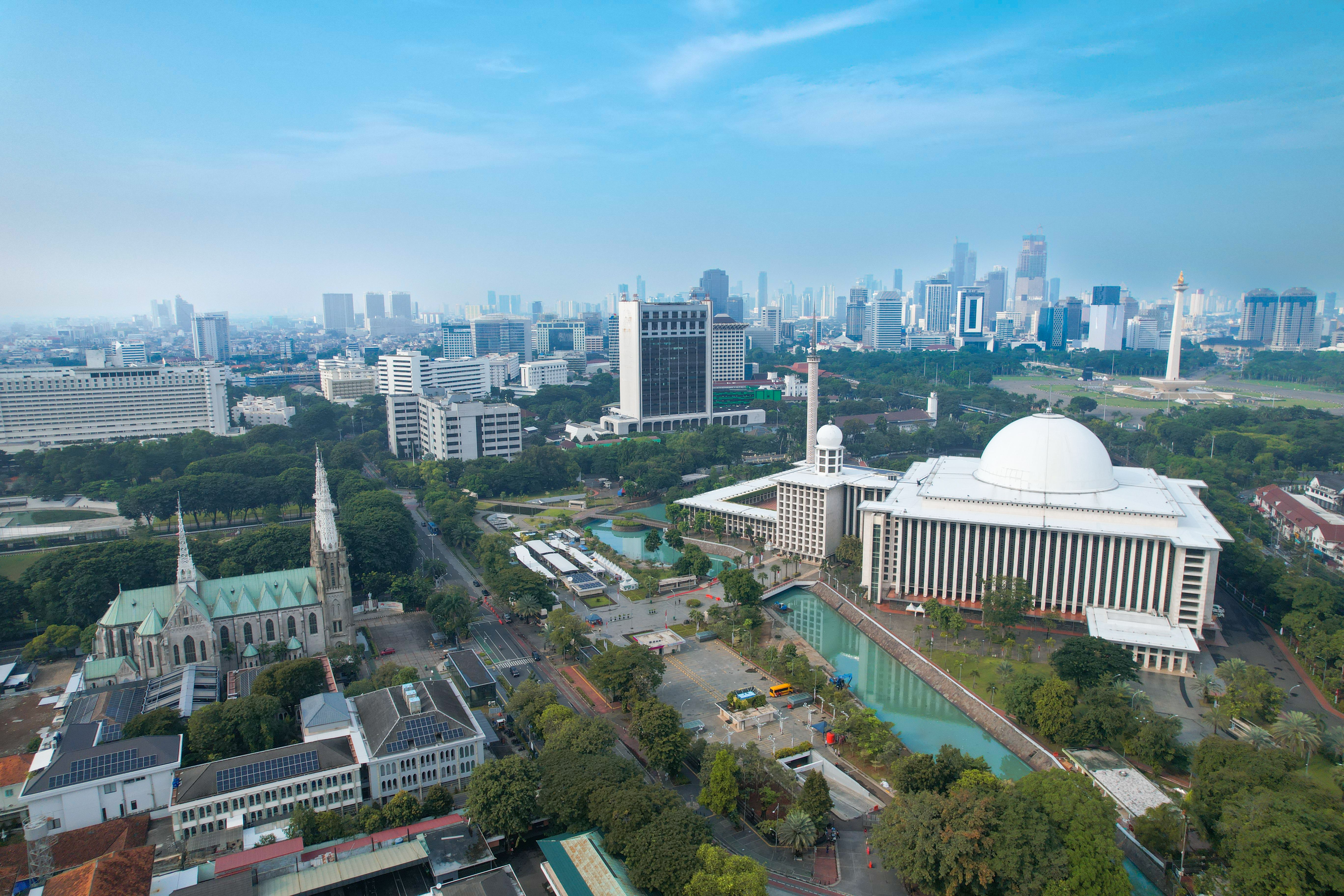 Jakarta Cathedral and Istiqlal Mosque in City · Free Stock Photo