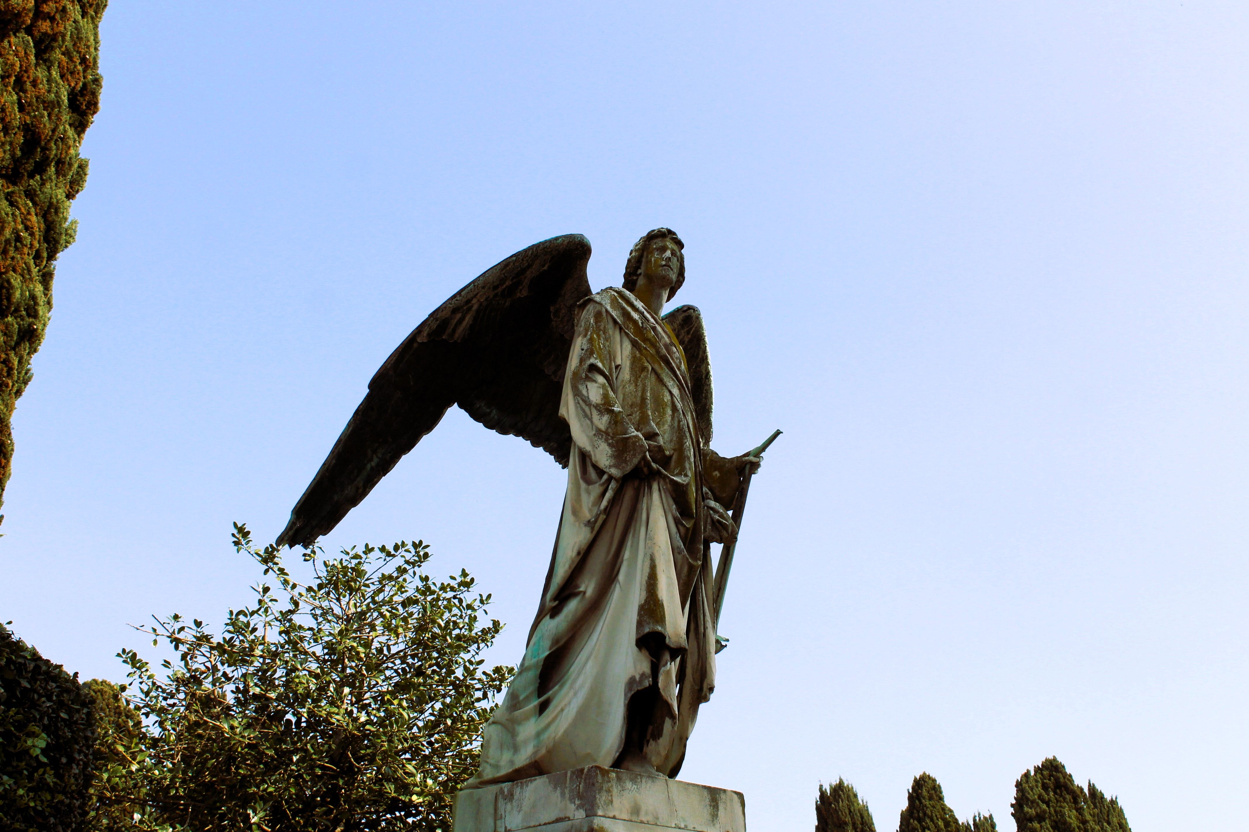 Angel Statue against Blue Sky · Free Stock Photo