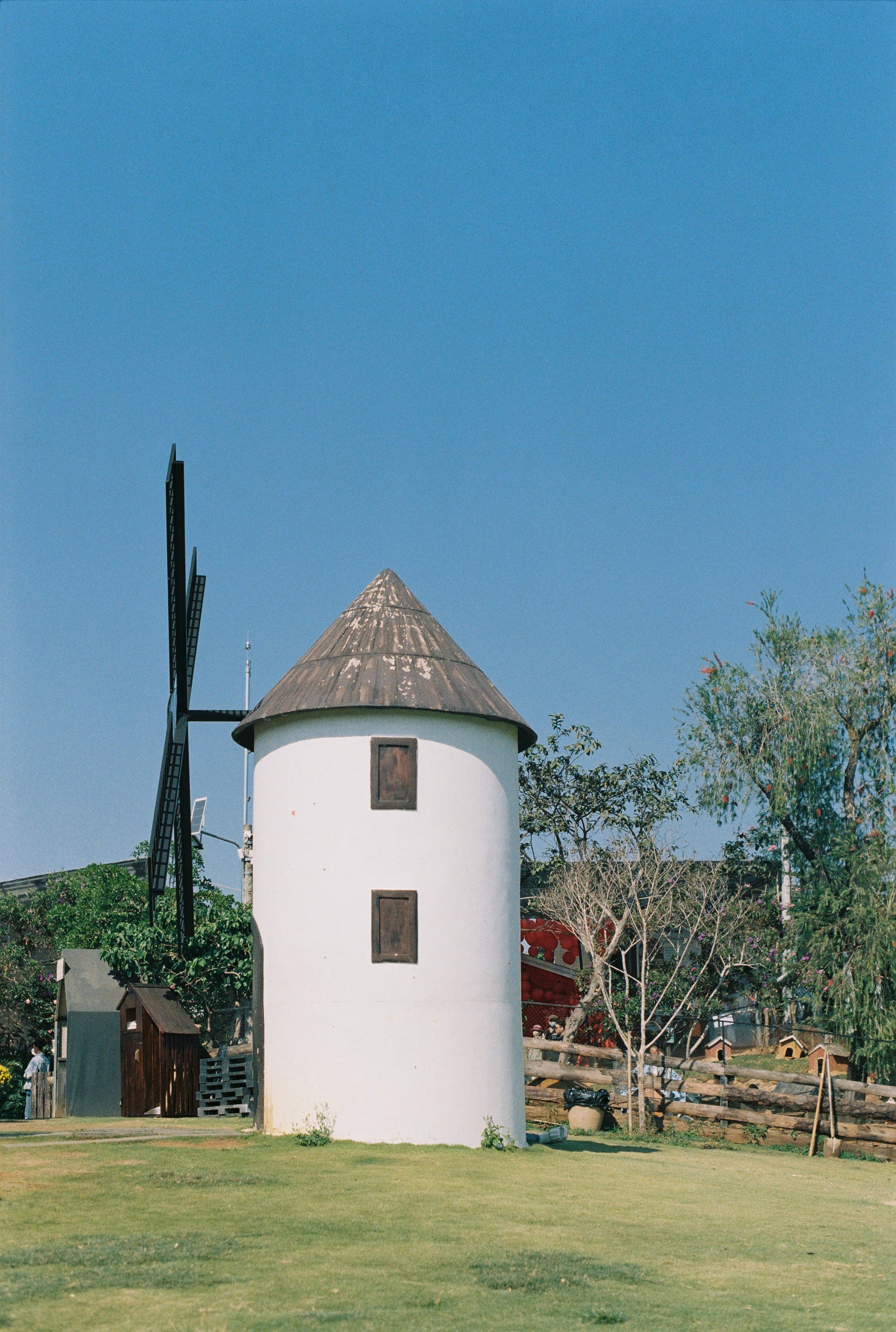 Vintage Windmill in Village · Free Stock Photo