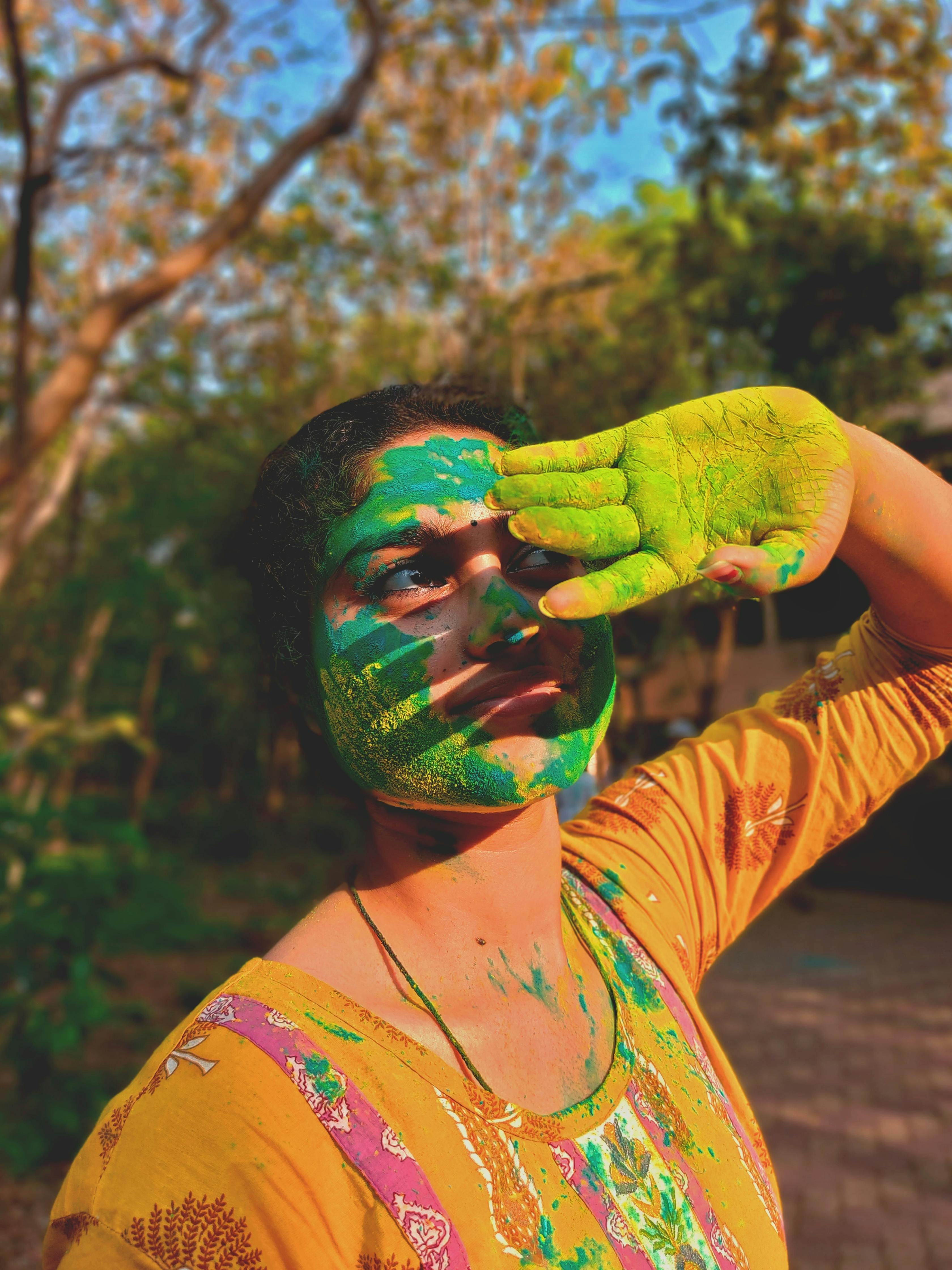 Green Powder on Woman Face and Hand · Free Stock Photo