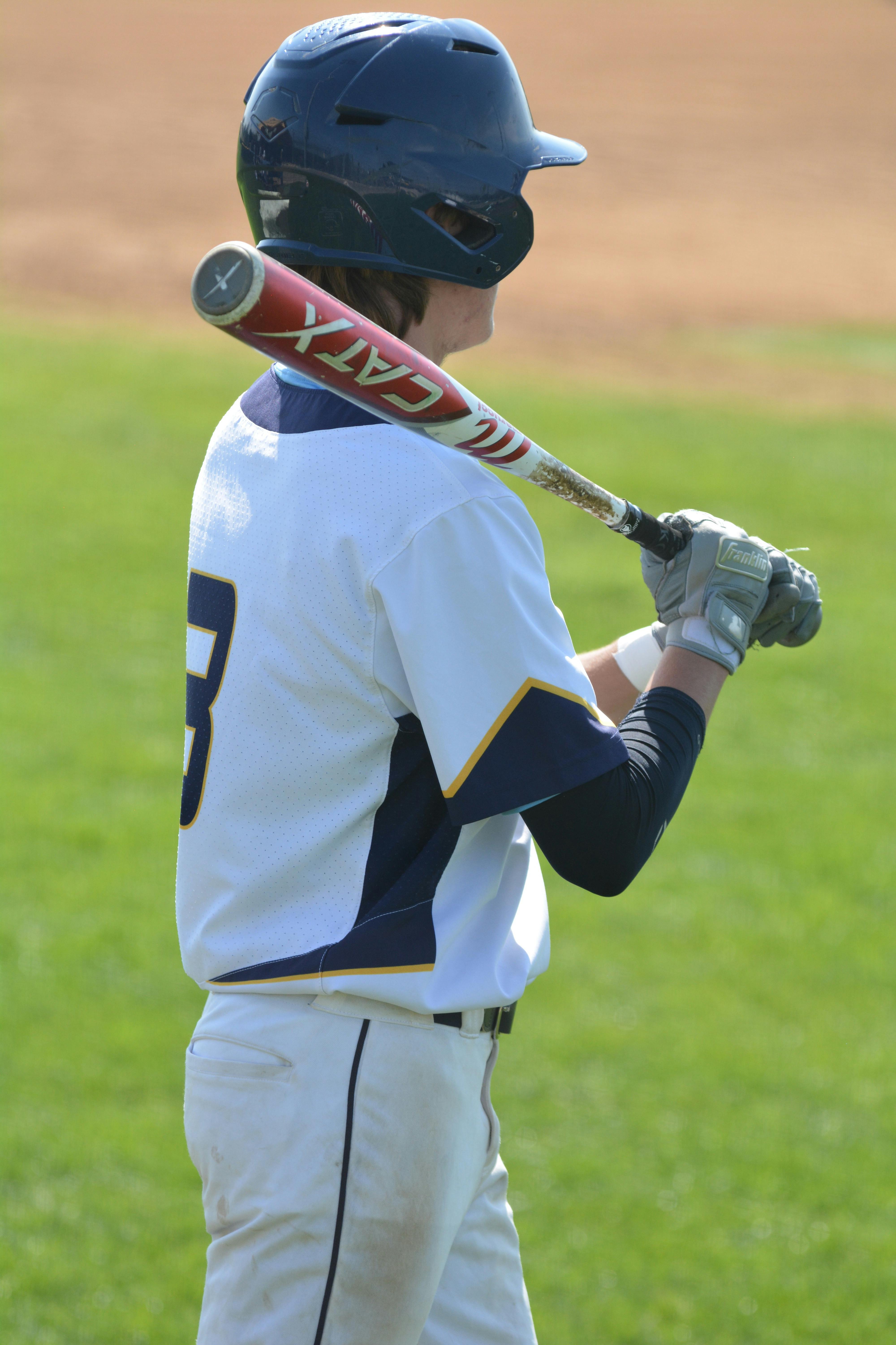 Person Holding Baseball Bat · Free Stock Photo