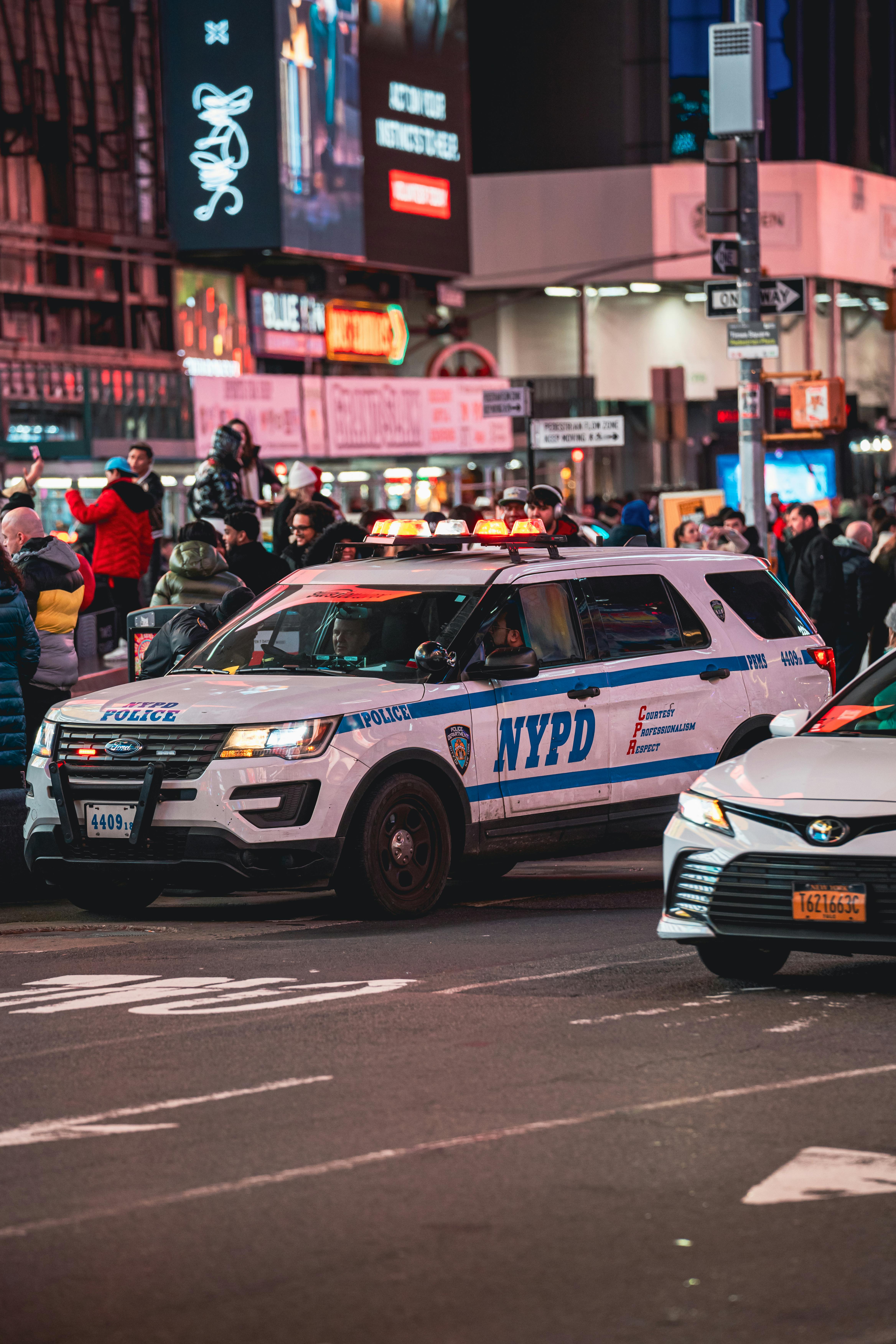 Police Car on a Street · Free Stock Photo