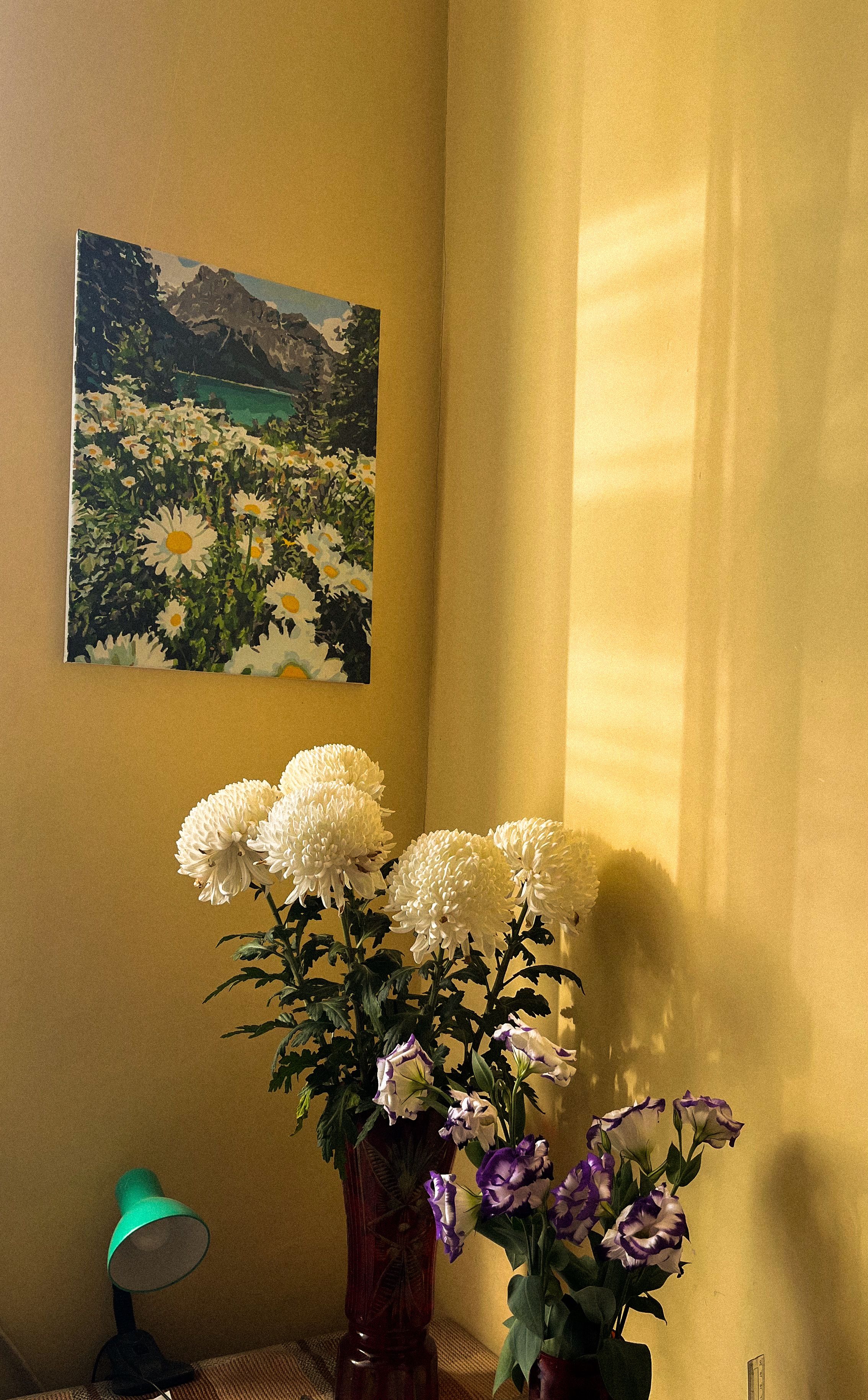 Flowers near Painting on Wall · Free Stock Photo