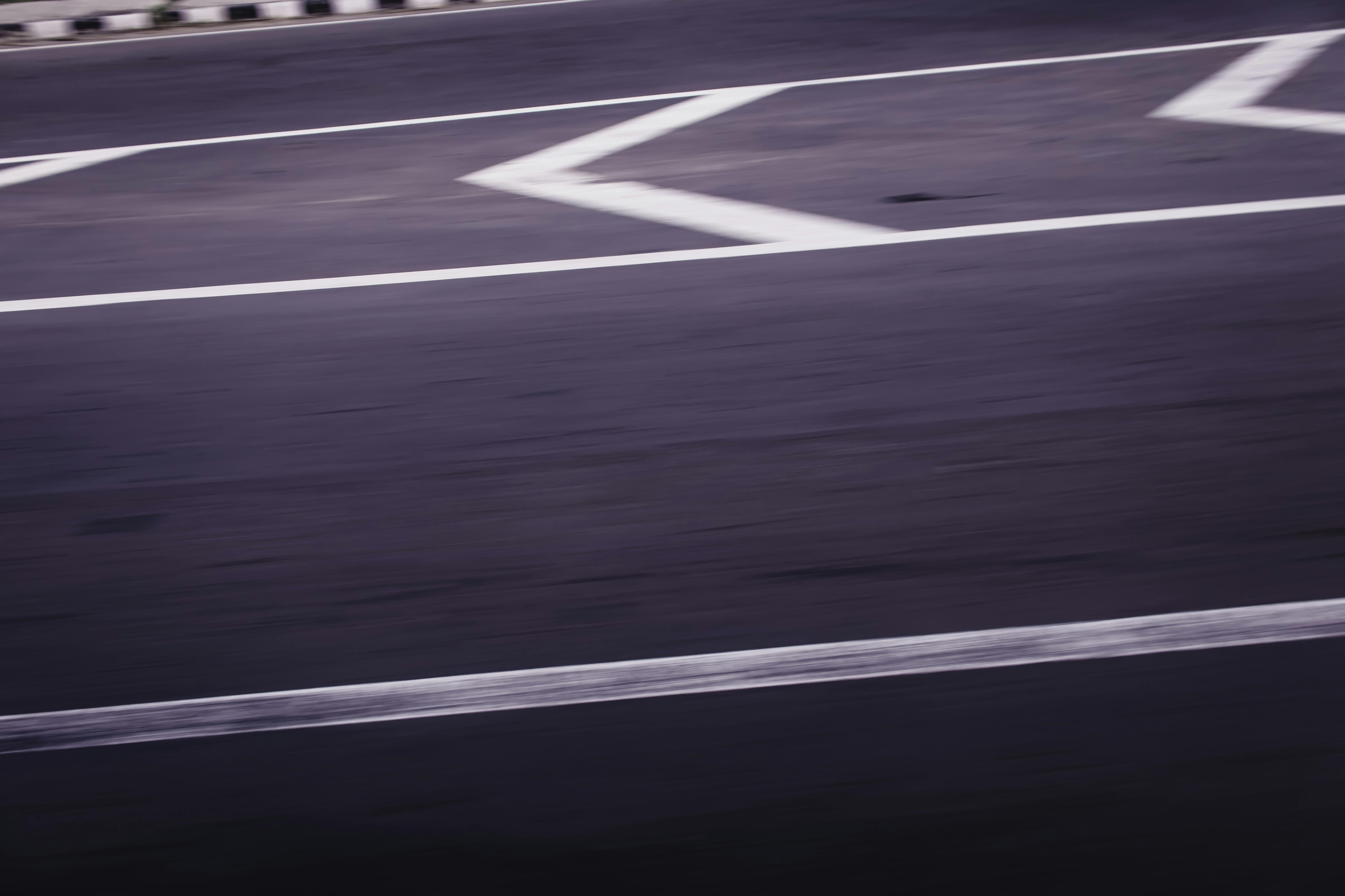 Blurry Photo of Roadway · Free Stock Photo