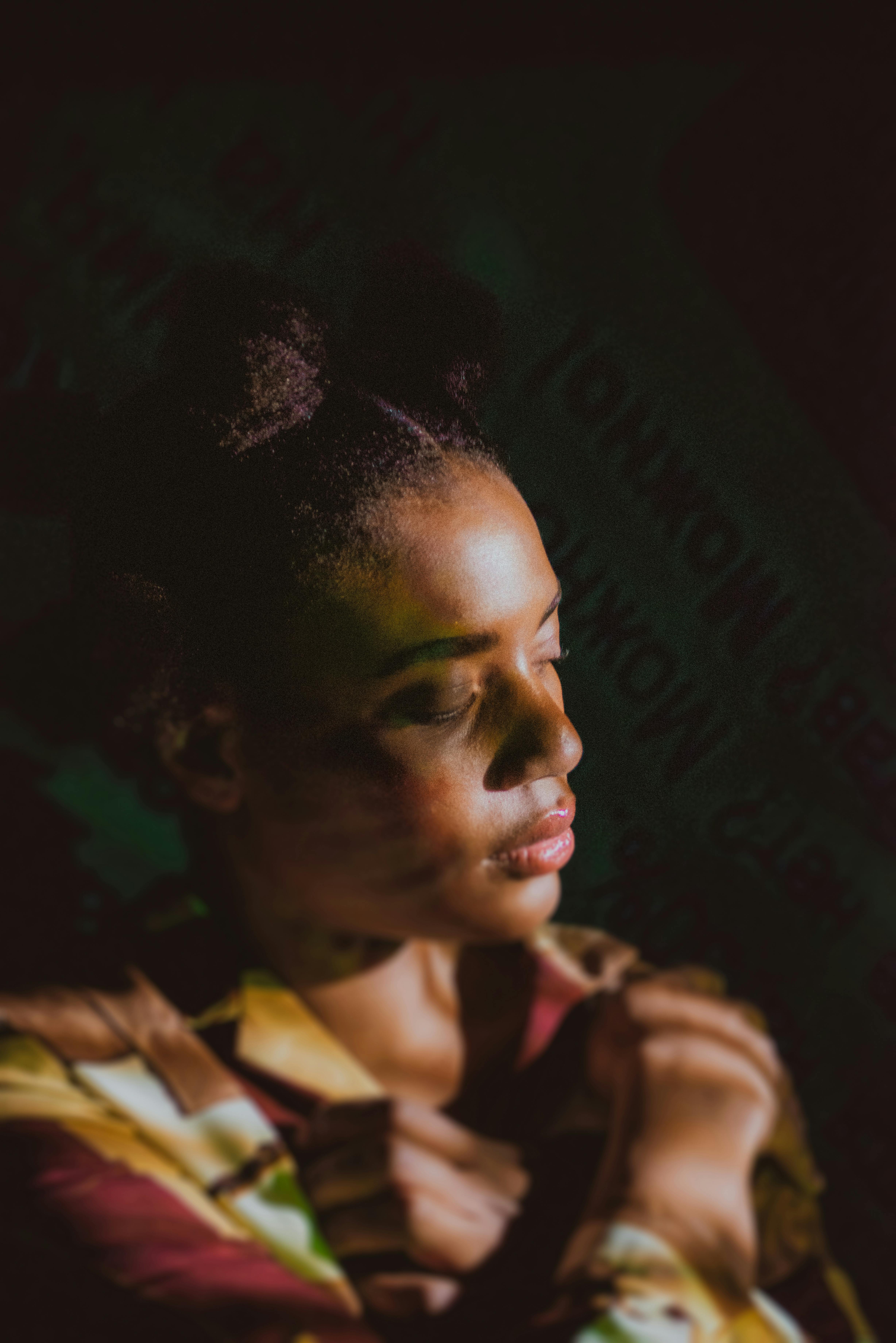 Portrait of Woman with Sunlit Face · Free Stock Photo