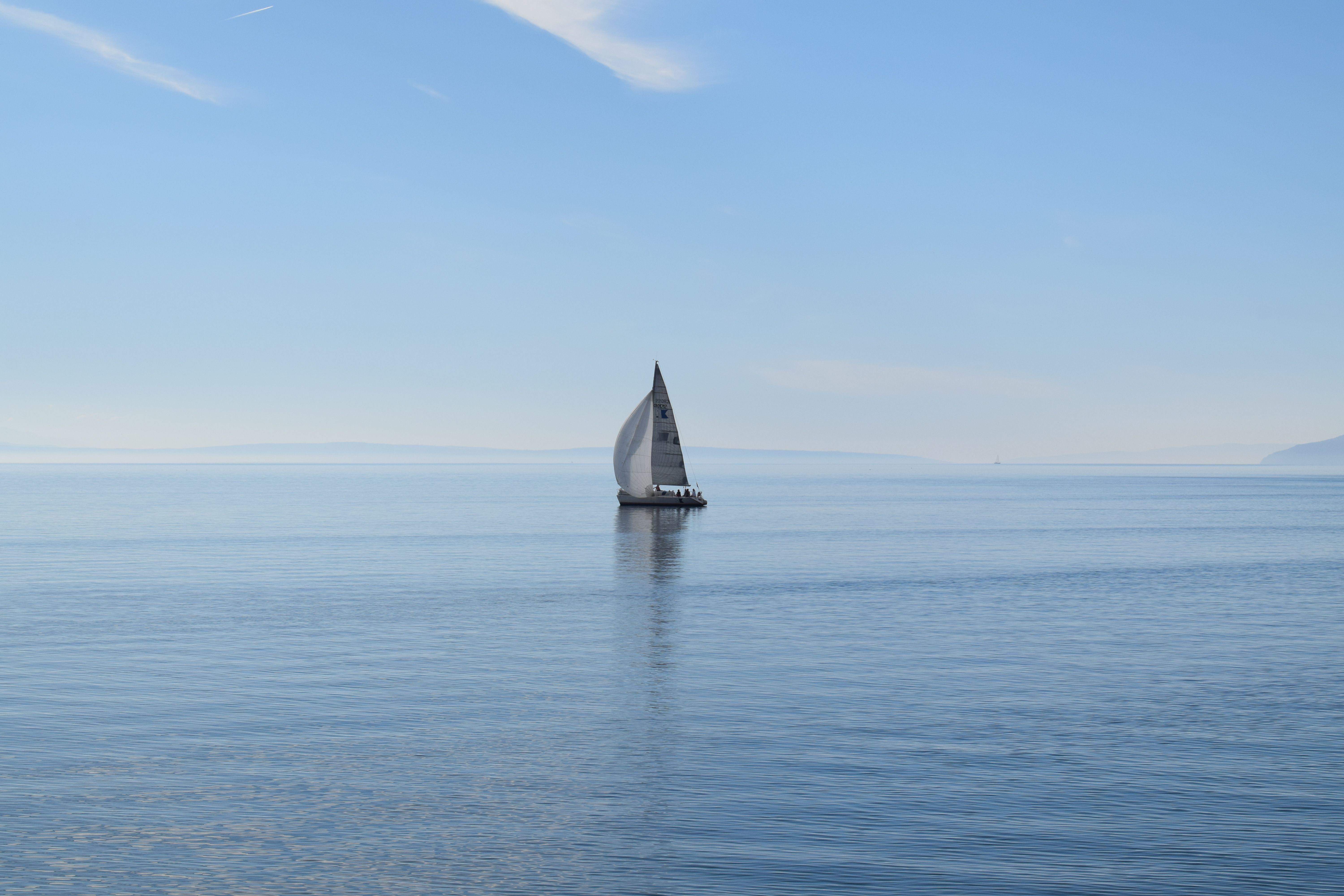 Sailboat on Calm Sea · Free Stock Photo