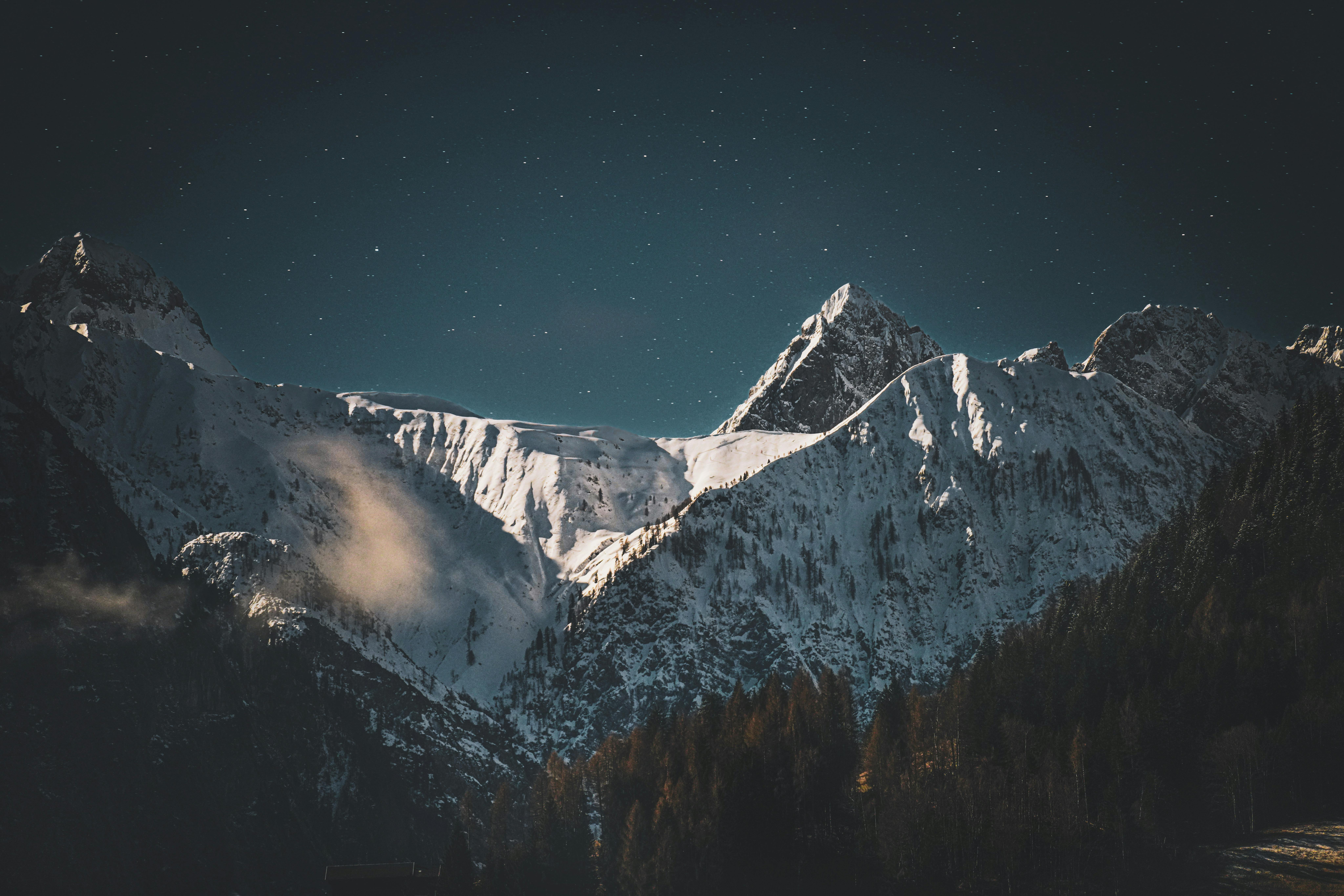 Snowy Mountains at Night · Free Stock Photo