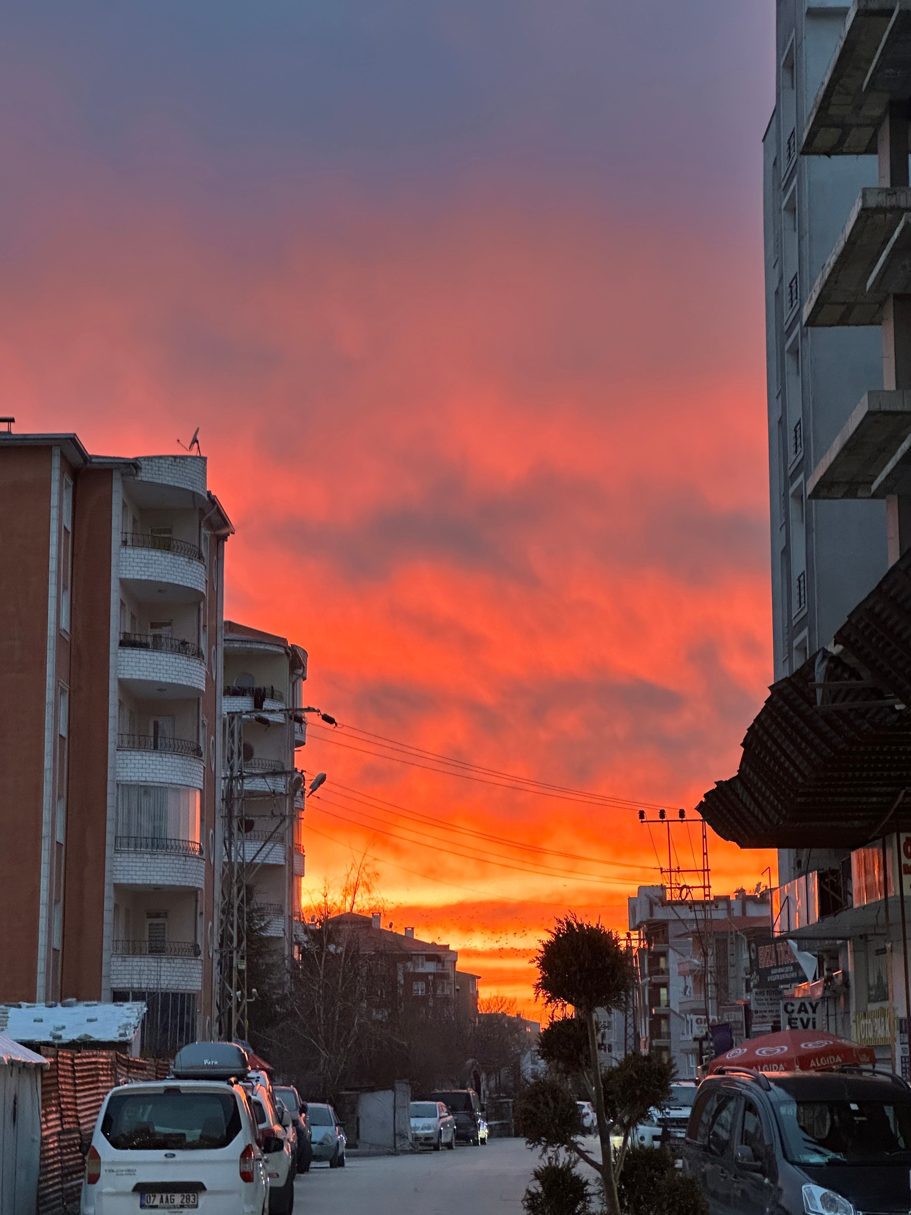 Red Sky over City Street at Sunset · Free Stock Photo