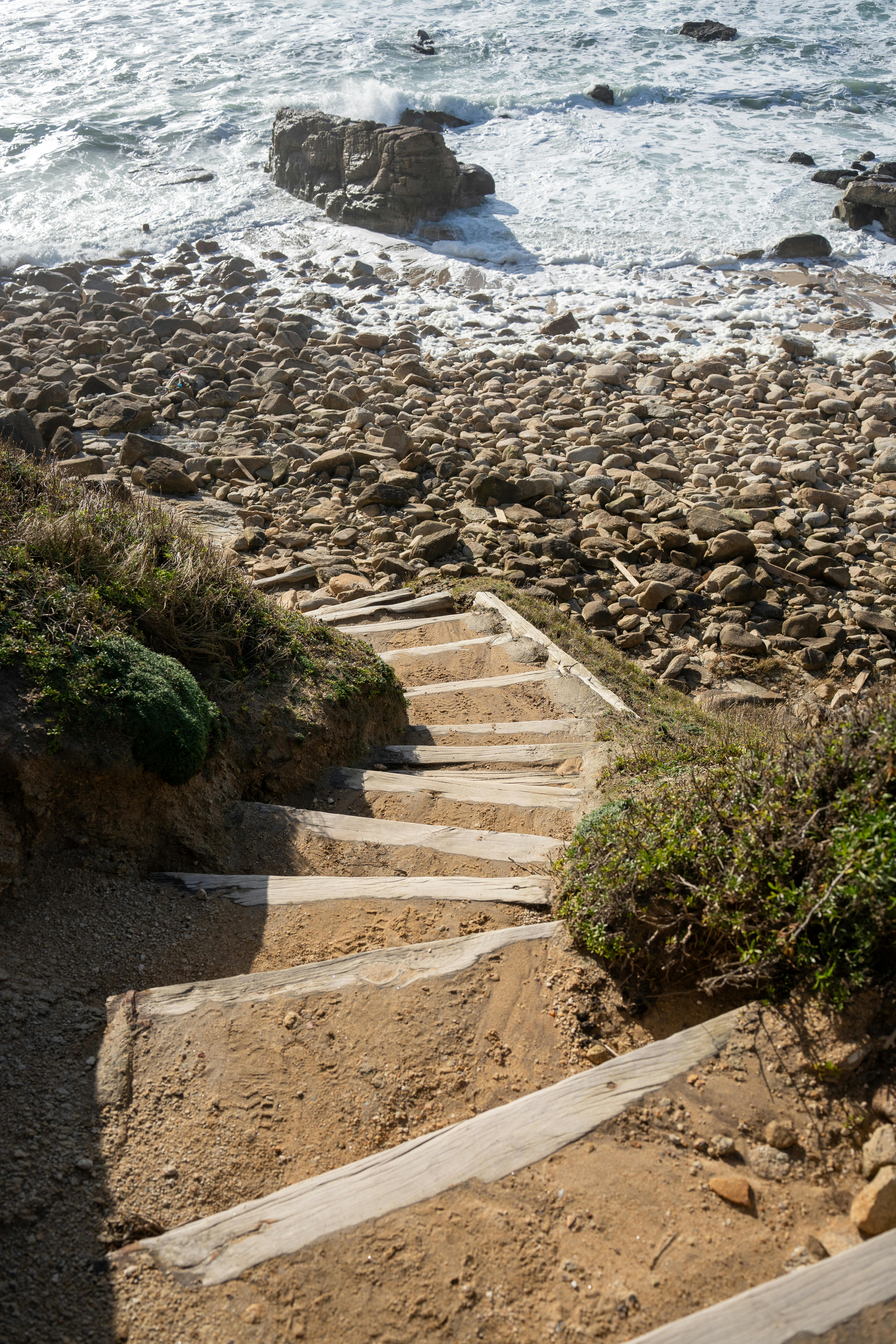 Steps Leading to a Rocky Seashore · Free Stock Photo