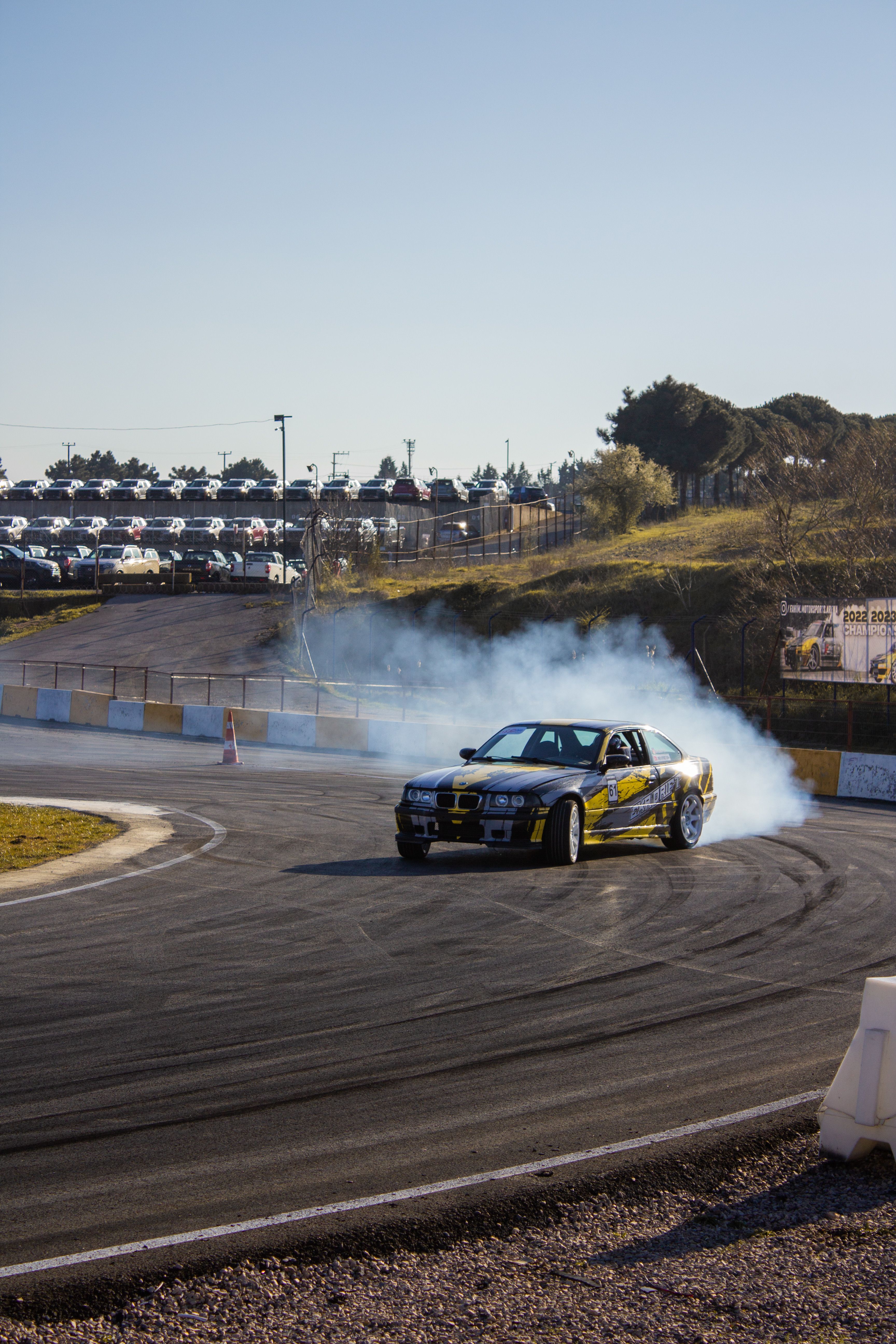 Black Race Car Drifting on Race Track · Free Stock Photo