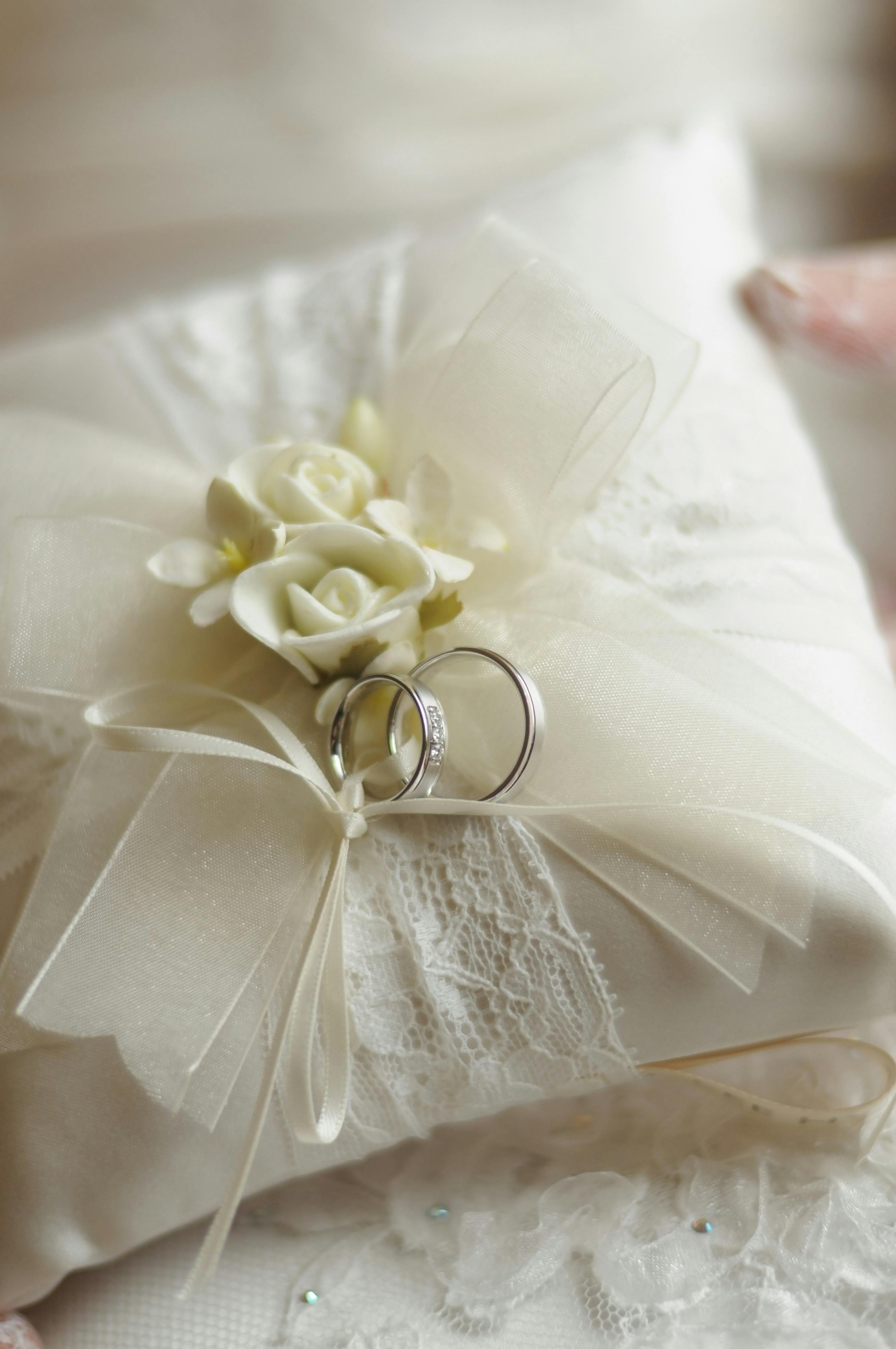 Wedding Rings on Pillow · Free Stock Photo