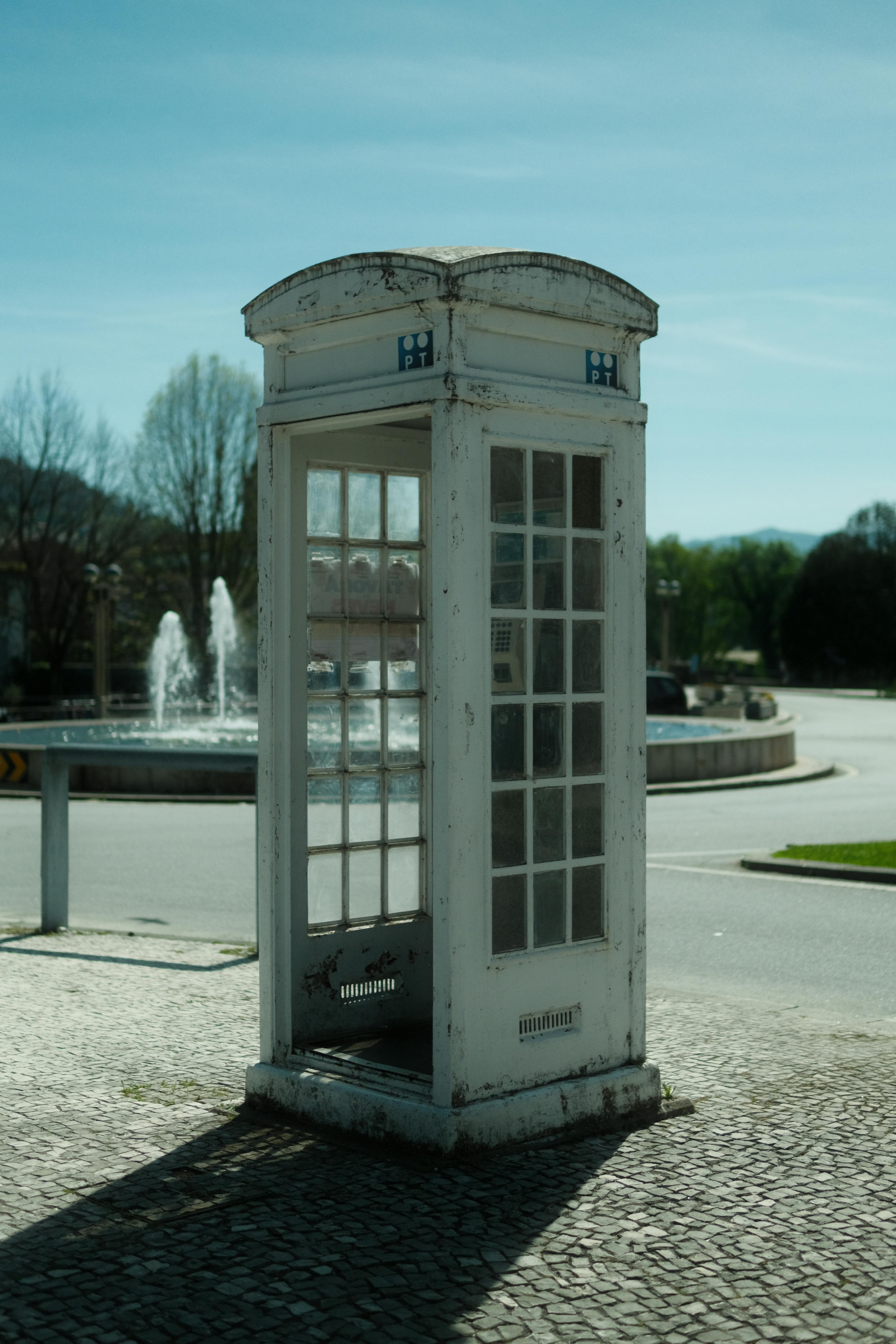 White Telephone Booth in Park · Free Stock Photo