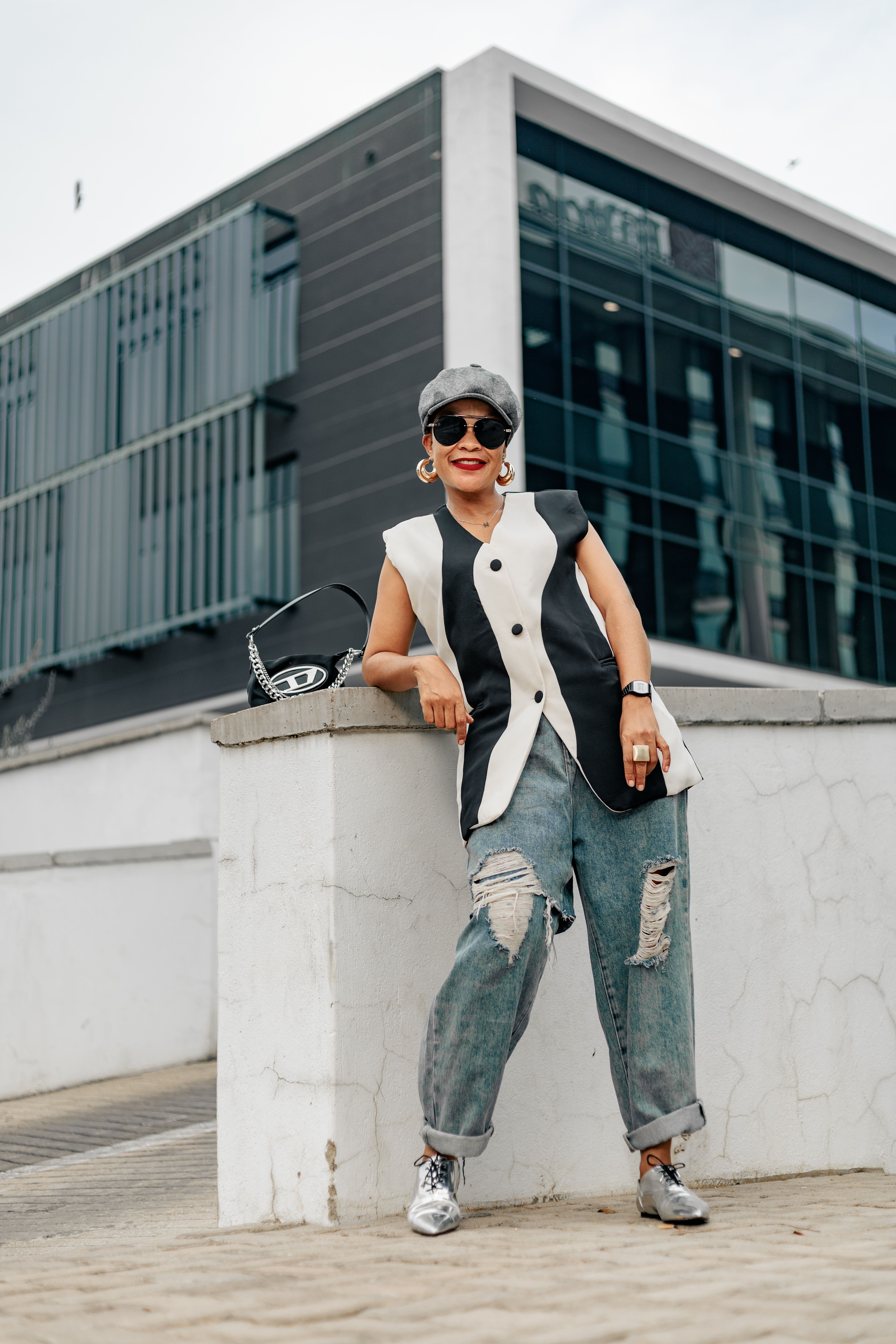 A Fashionable Woman Posing near a Modern Building in a City · Free ...