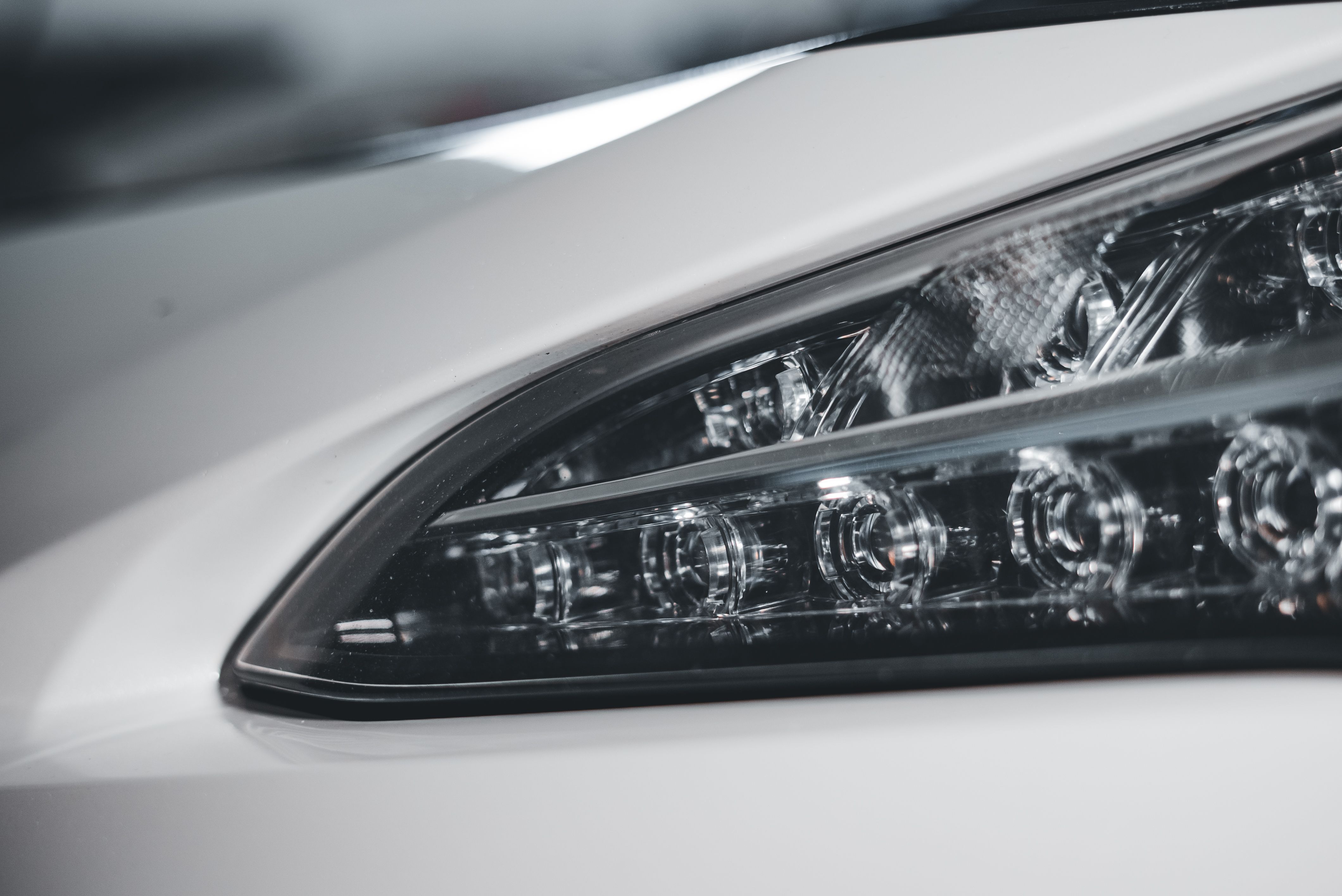 Headlight of Sports White Car · Free Stock Photo