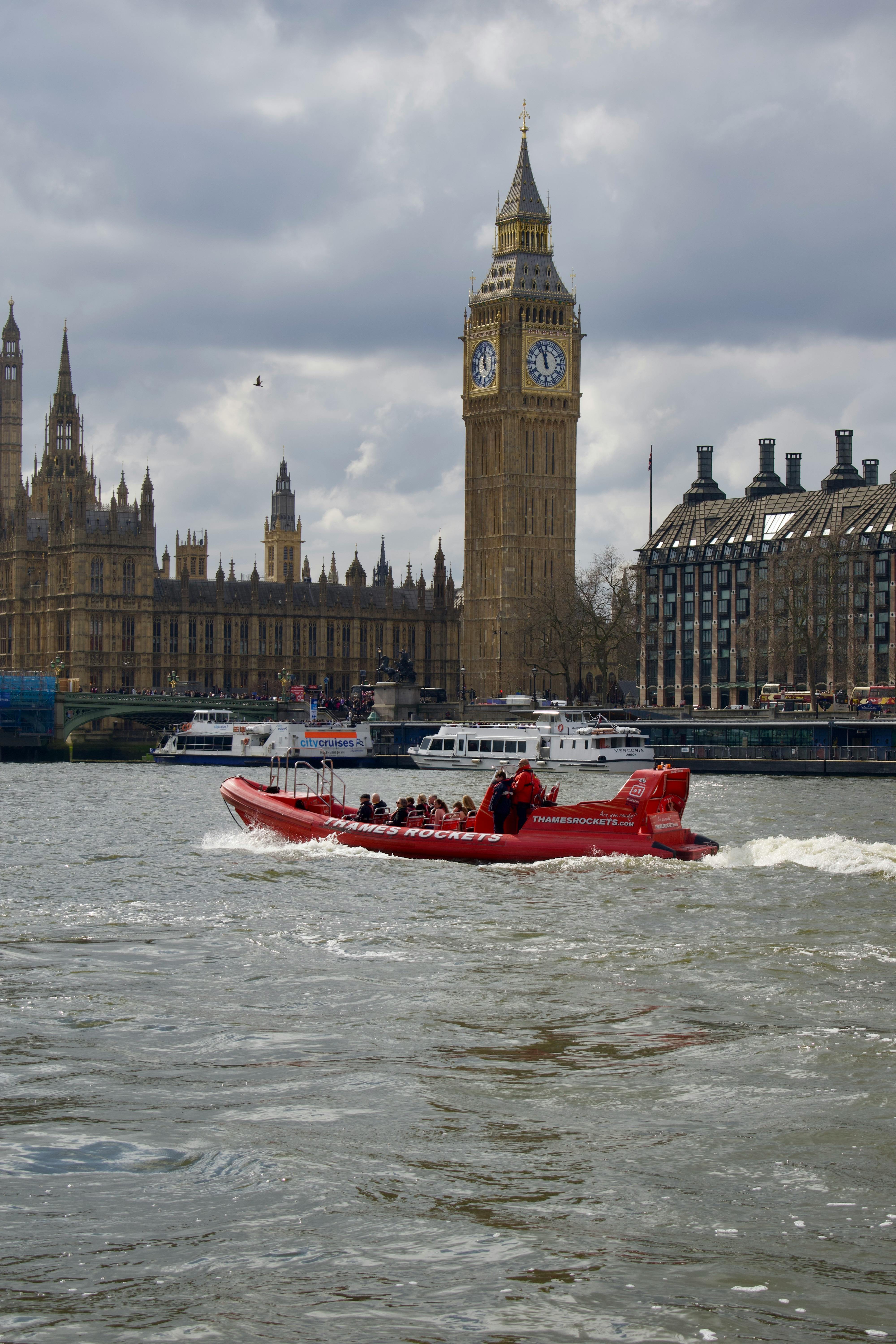 Motorboat on Thames near Big Ben in London · Free Stock Photo