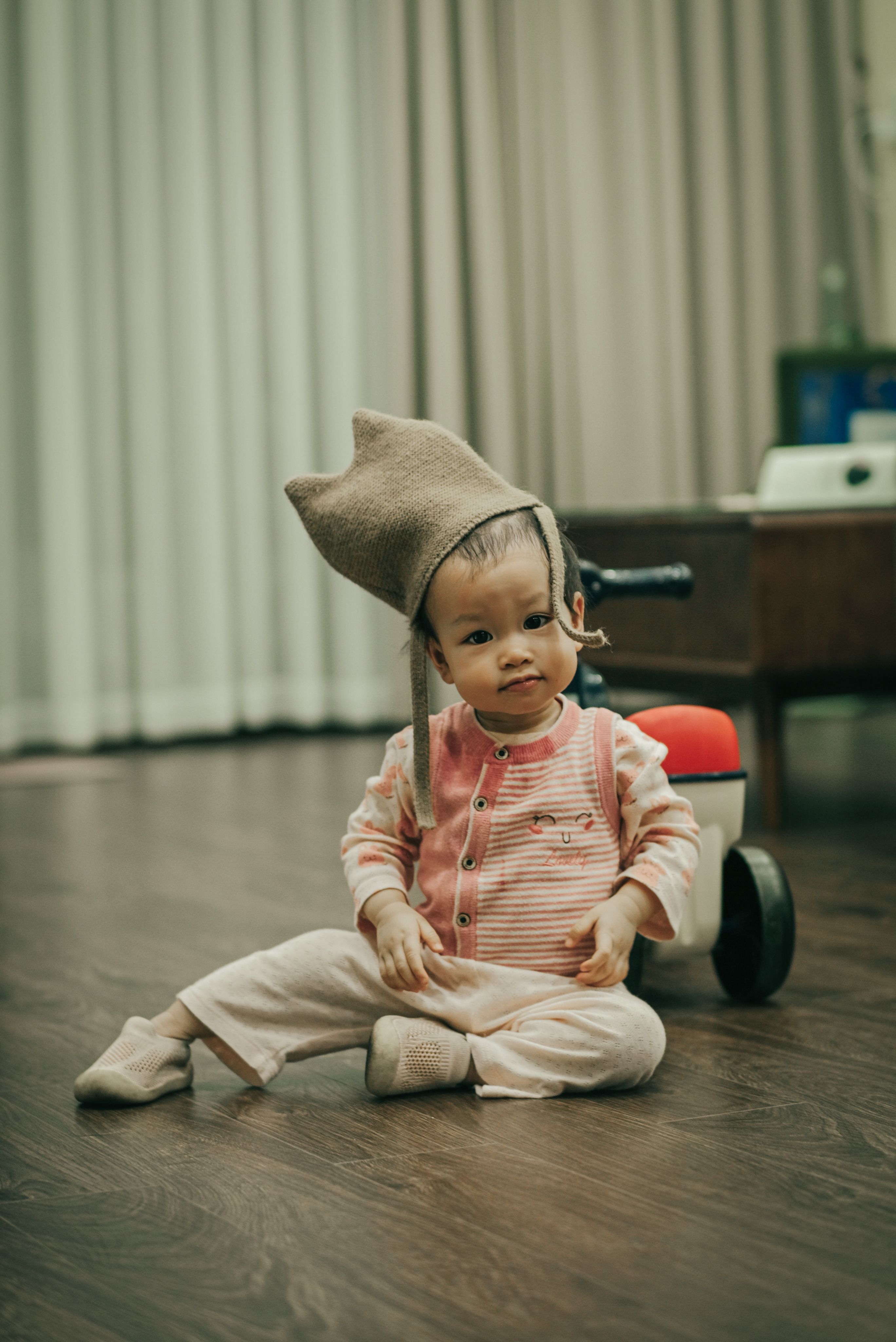 Child Sitting on Floor · Free Stock Photo