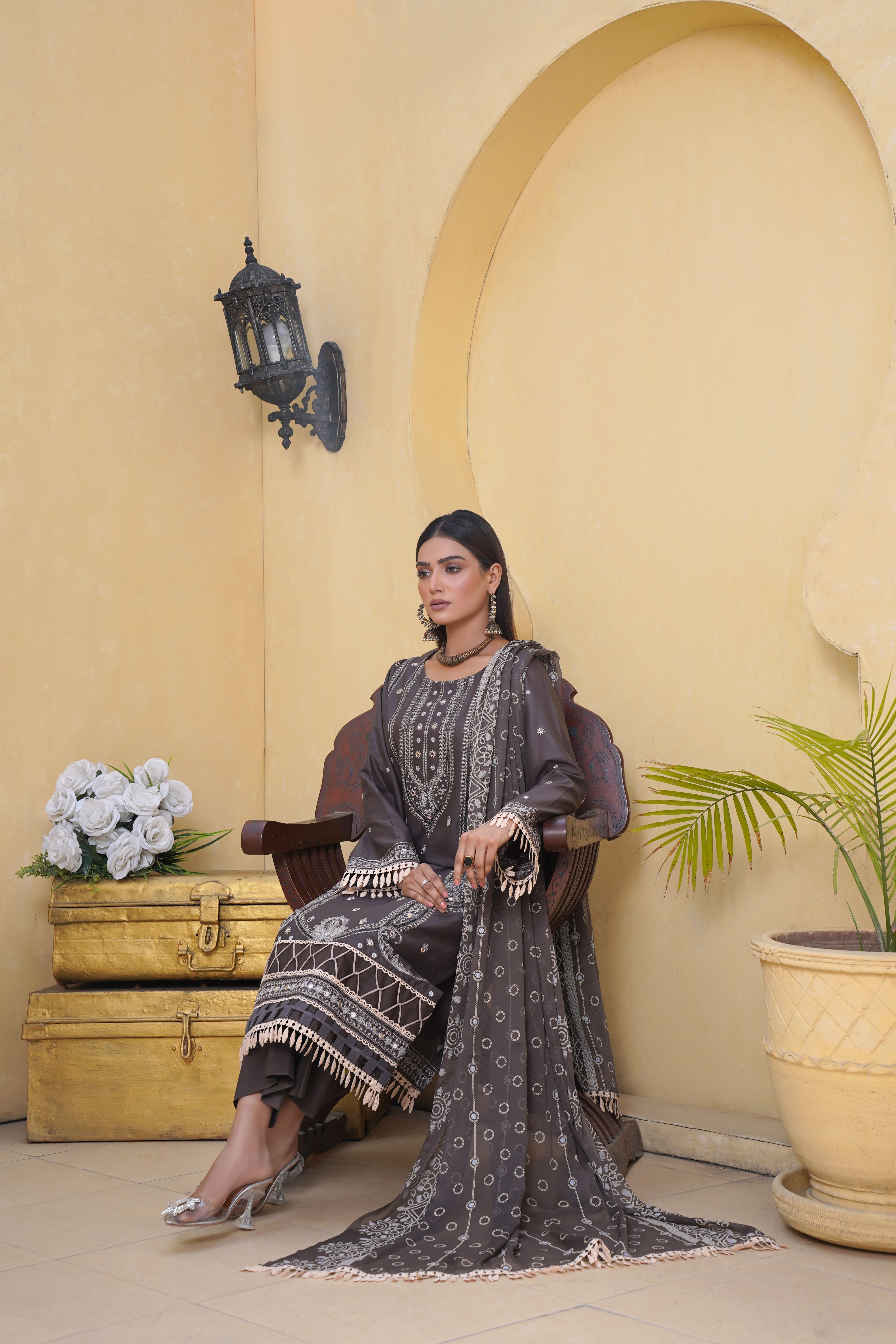 Young Woman Sitting and Posing in Traditional Clothing · Free Stock Photo