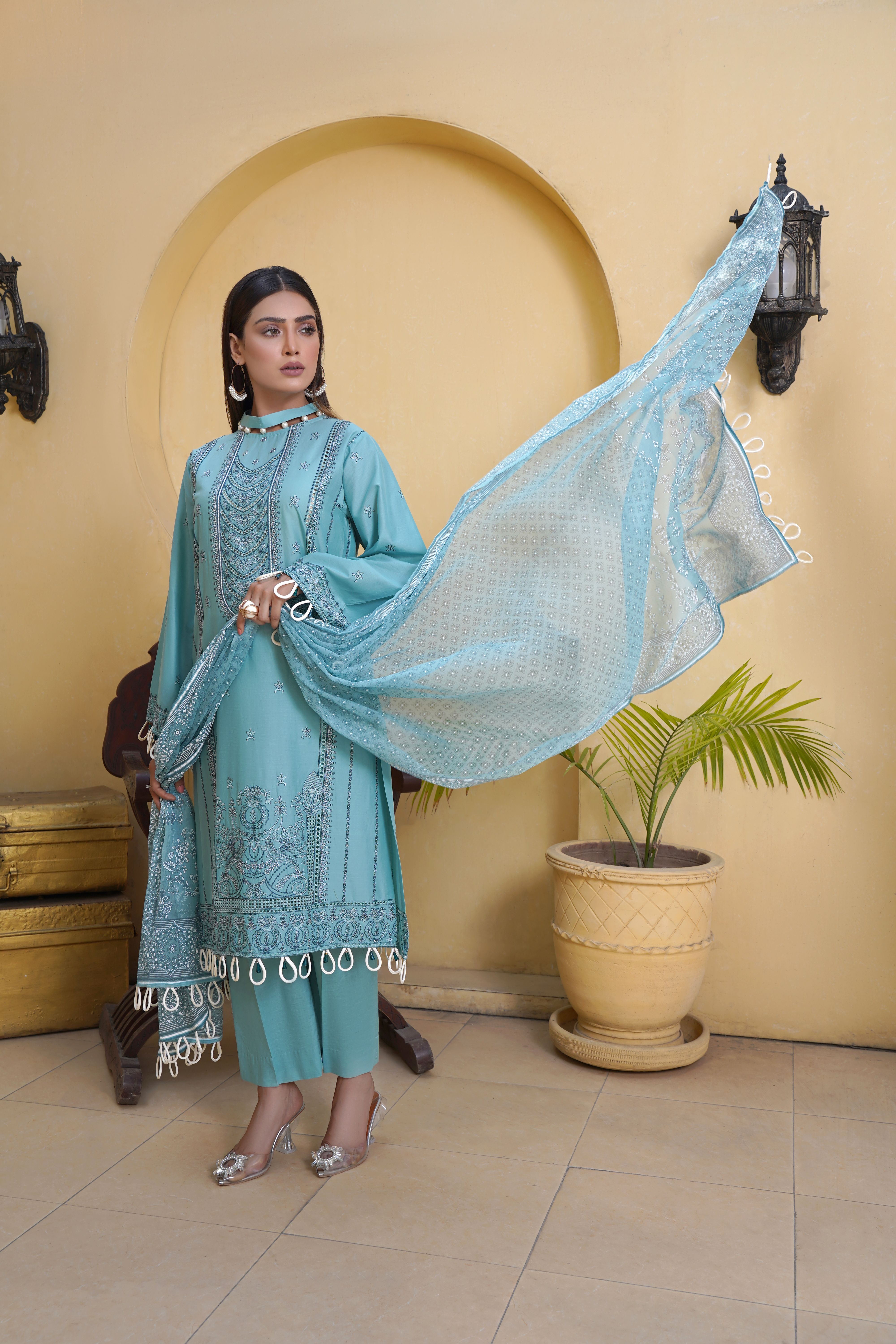Model in Blue Tunic Posing with Scarf · Free Stock Photo