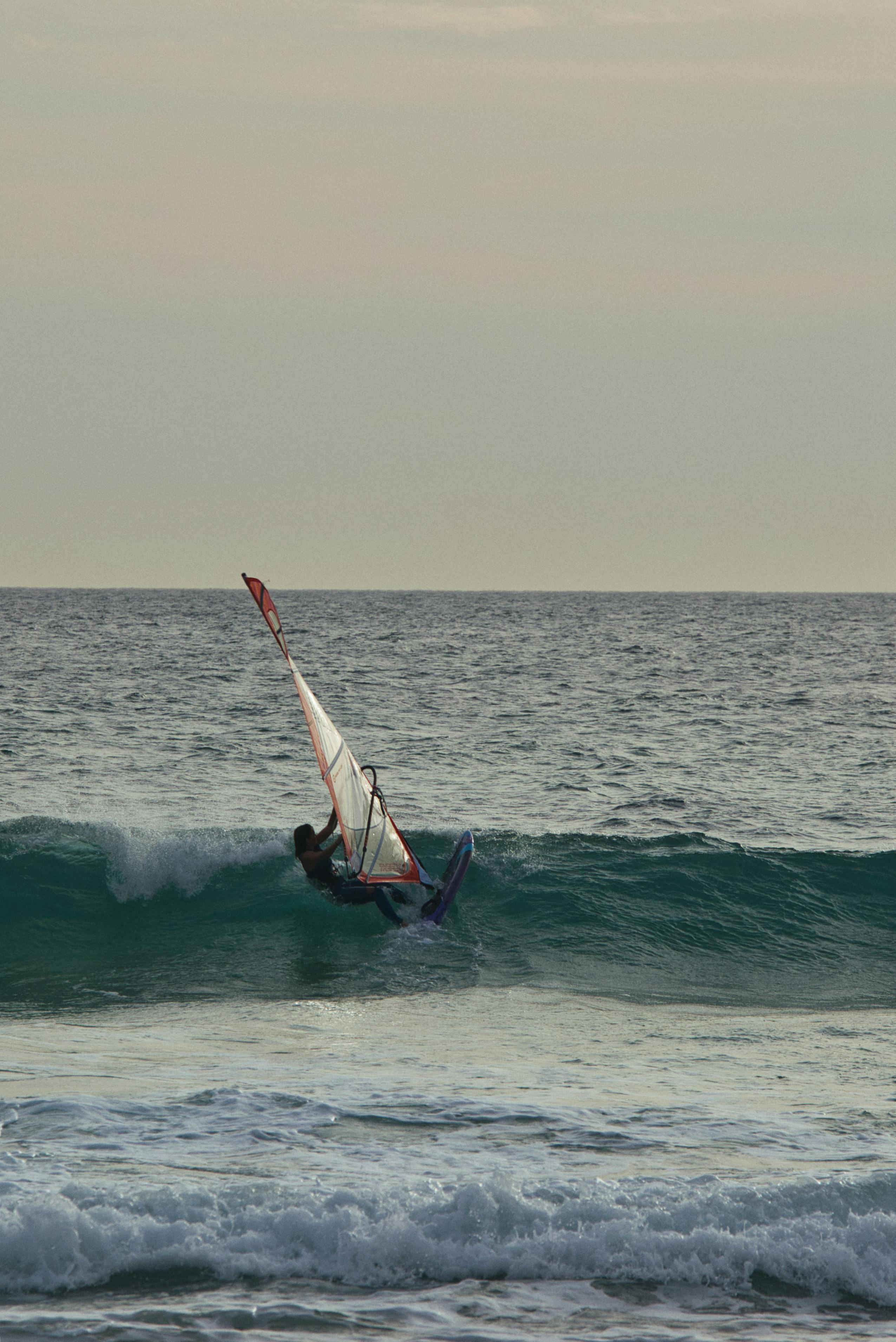 Person Doing Surfboarding · Free Stock Photo