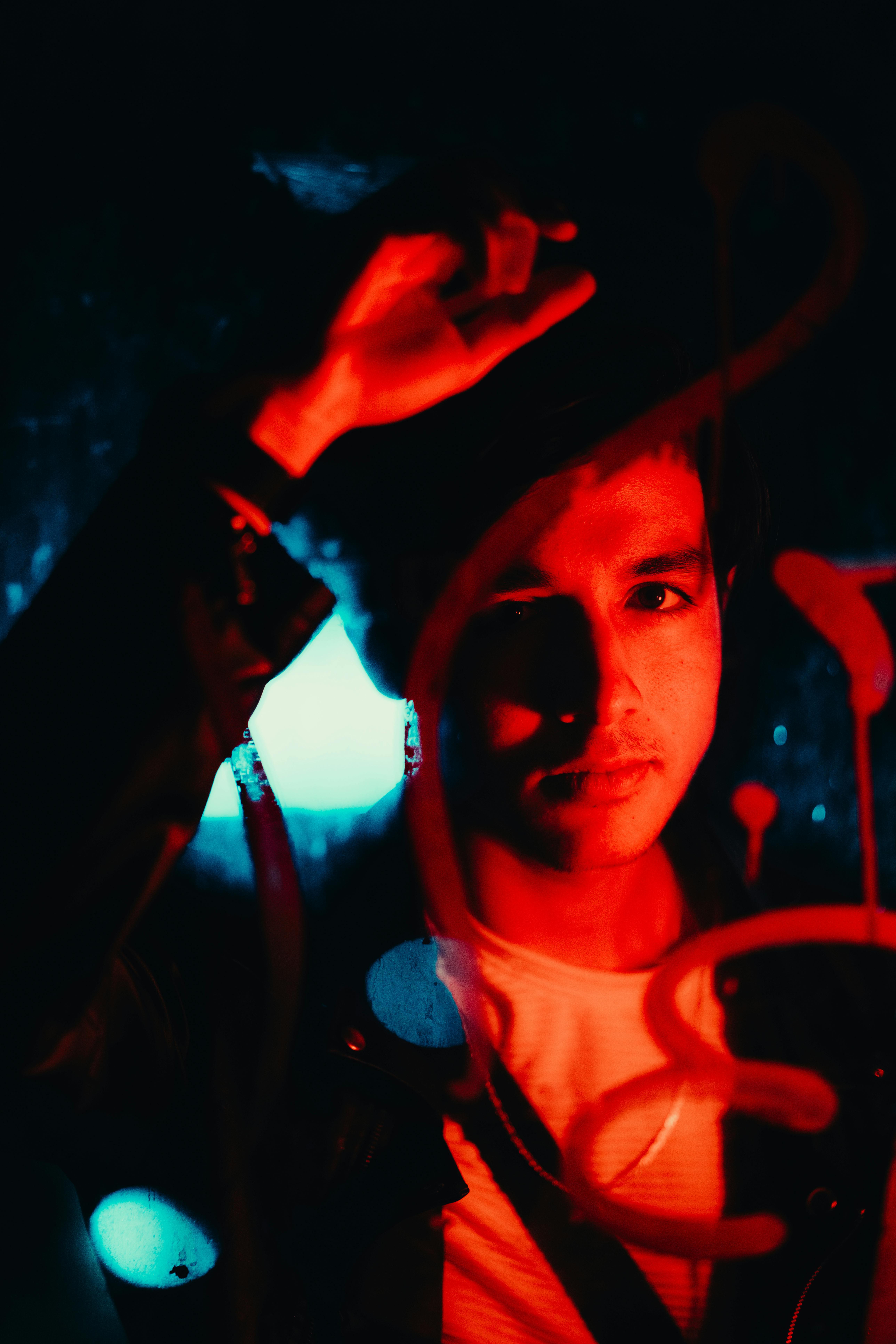 Illuminated Face behind Glass · Free Stock Photo