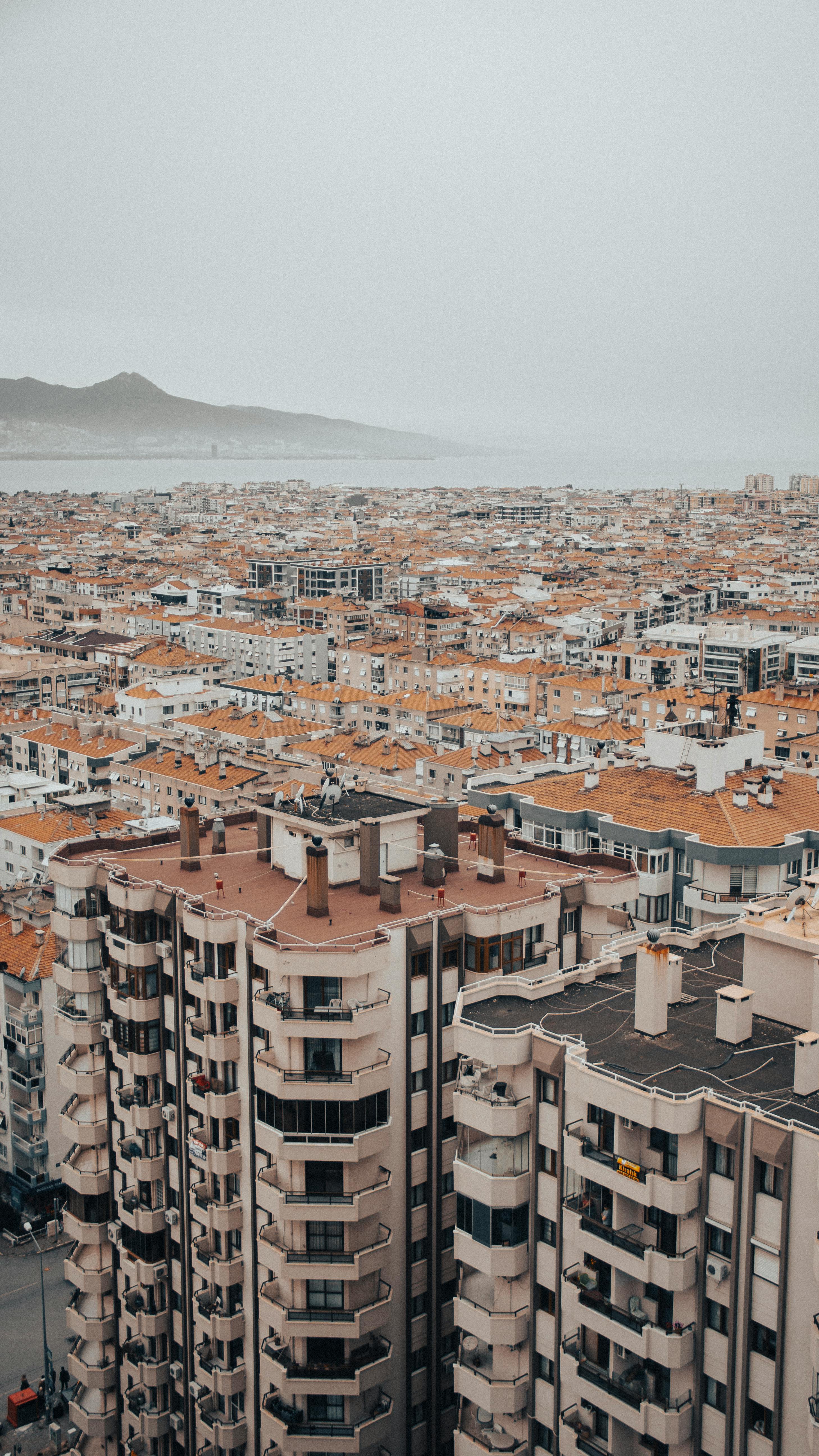 Residential Buildings Under Cloudy Sky · Free Stock Photo
