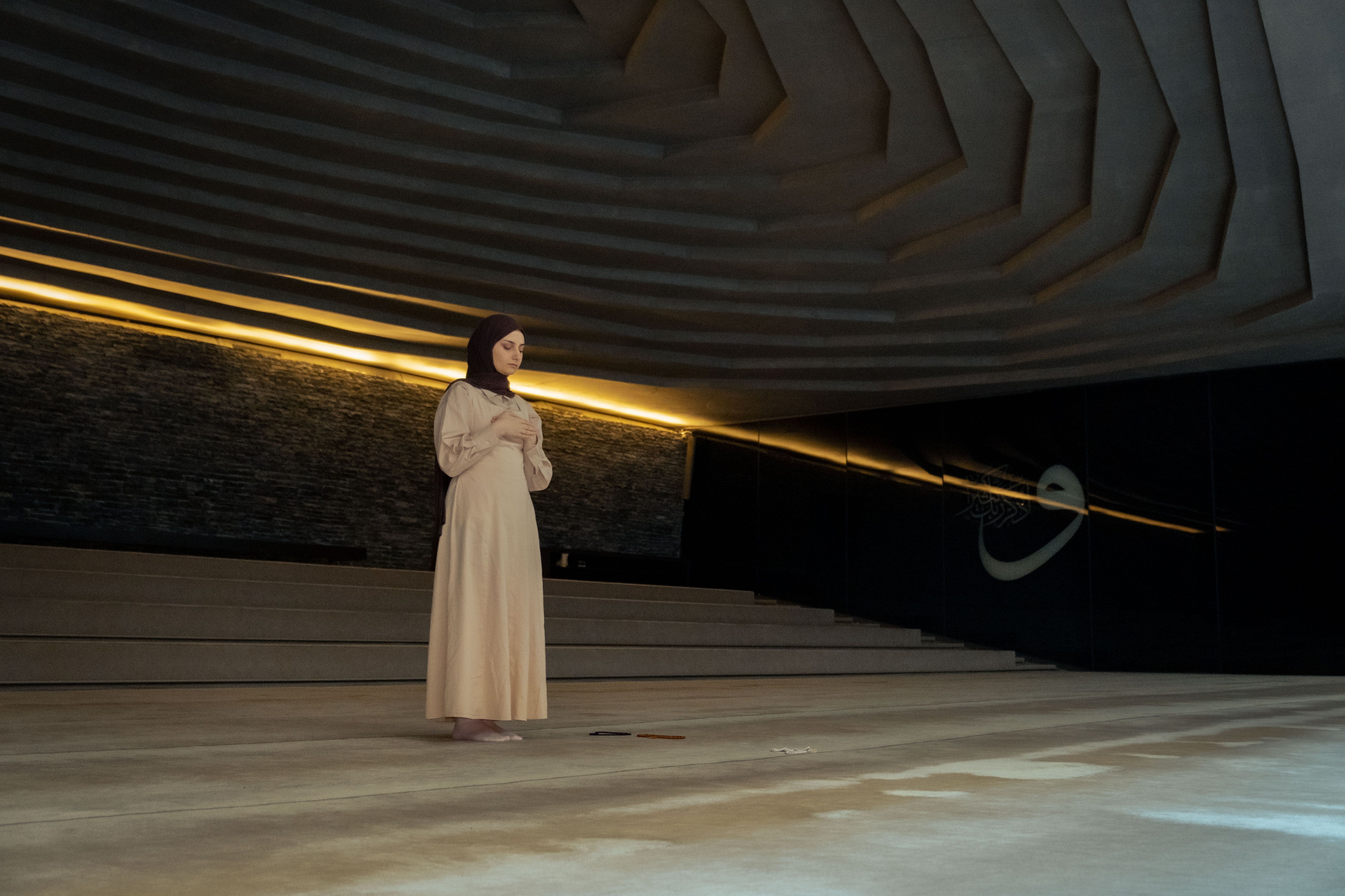 Woman Standing and Praying at Mosque · Free Stock Photo