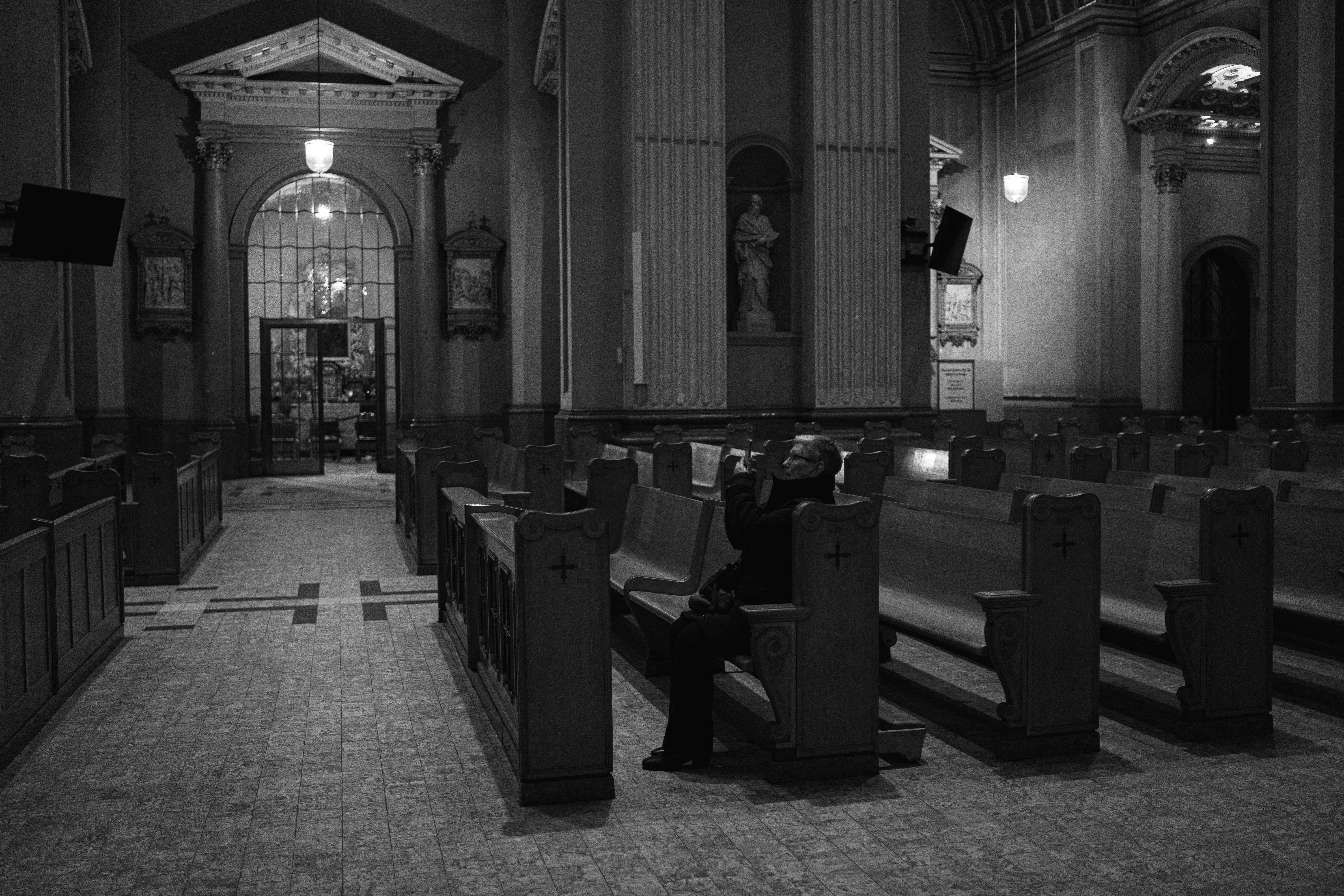 Brown Wooden Church Bench Near White Painted Wall · Free Stock Photo