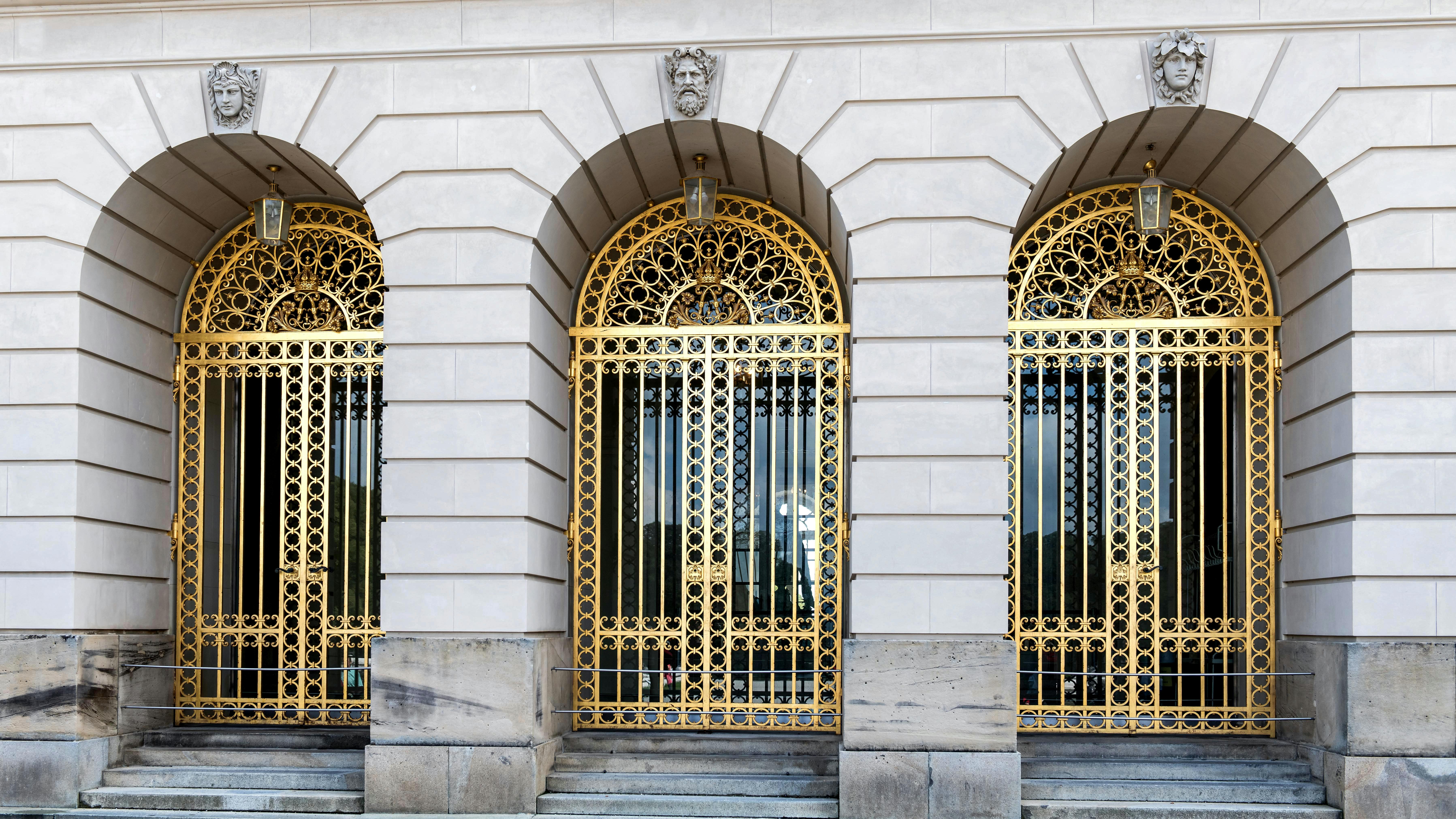 Golden Latticework in the Arched Windows of the Palace · Free Stock Photo