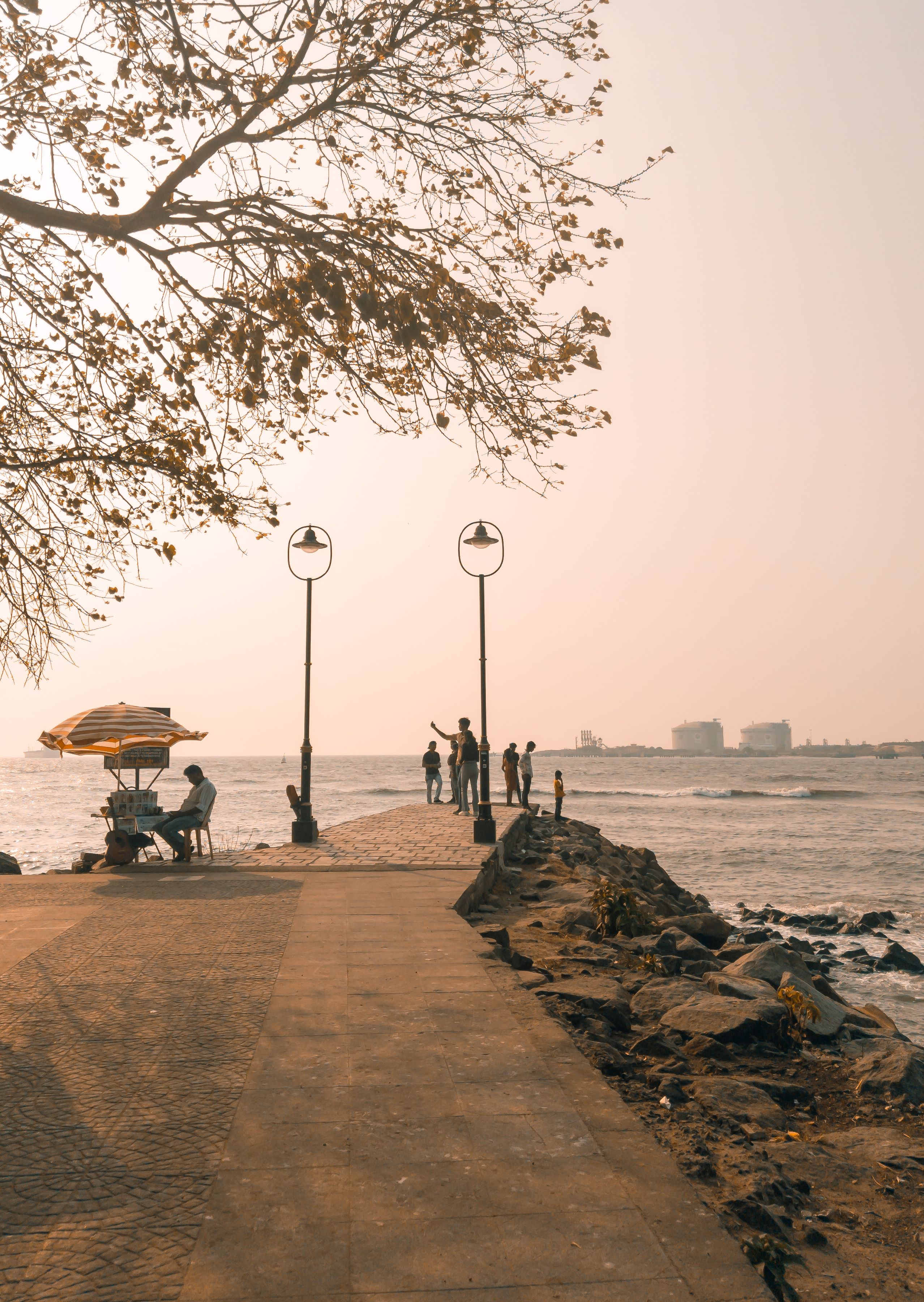 Tourists on the Seaside Promenade · Free Stock Photo