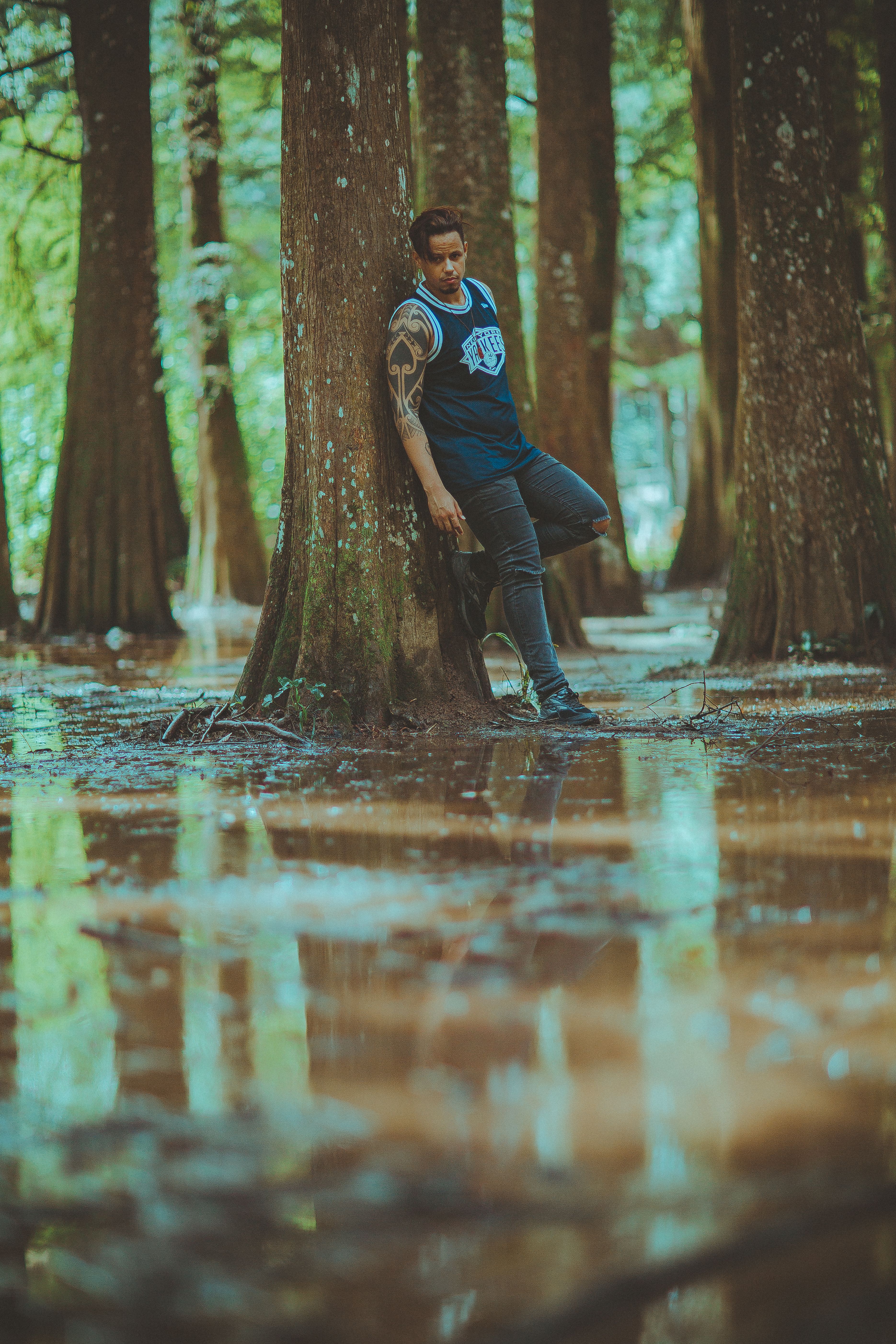 Man Leaning on Tree · Free Stock Photo