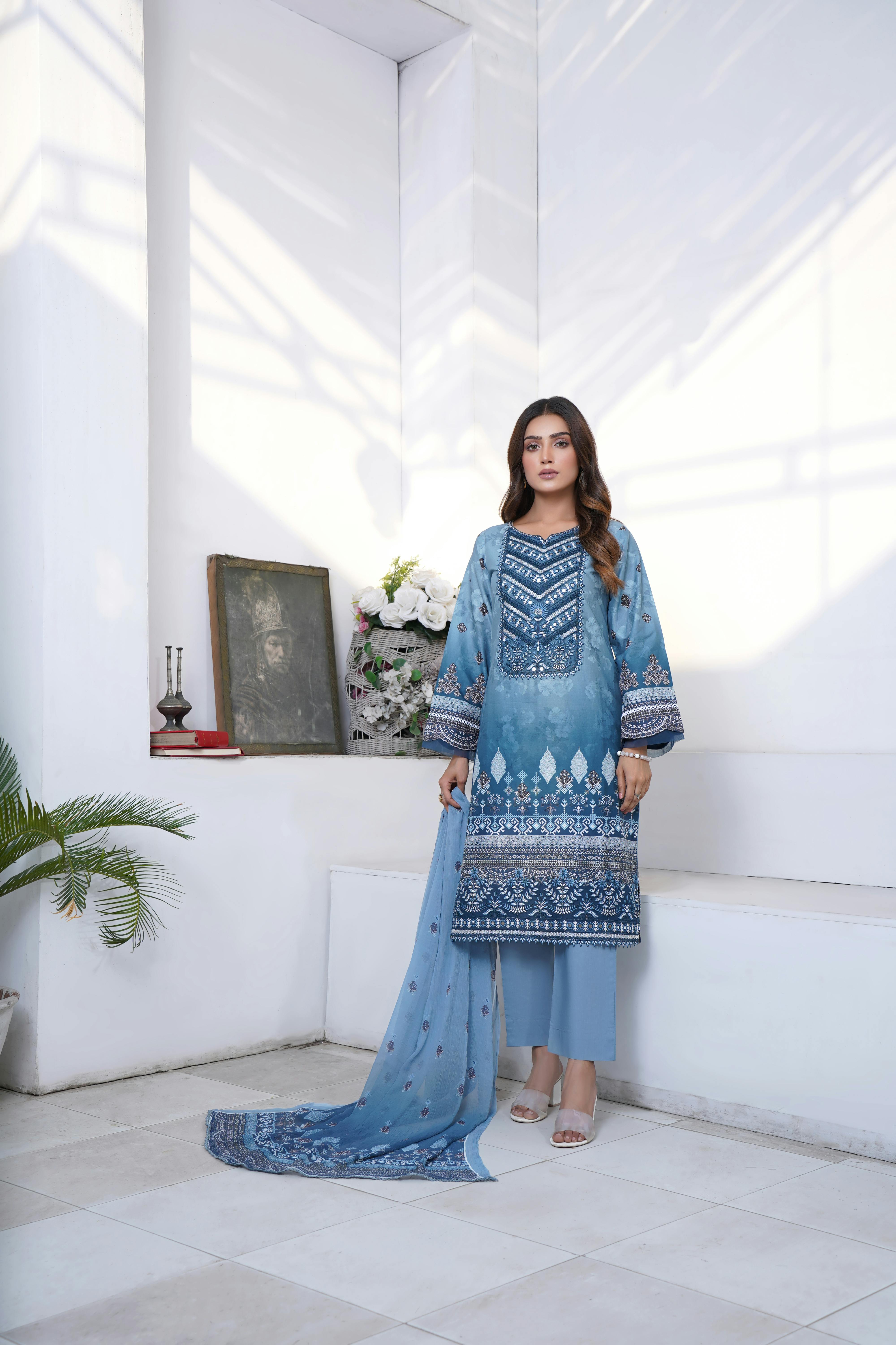 Woman in a Blue Traditional Dress · Free Stock Photo