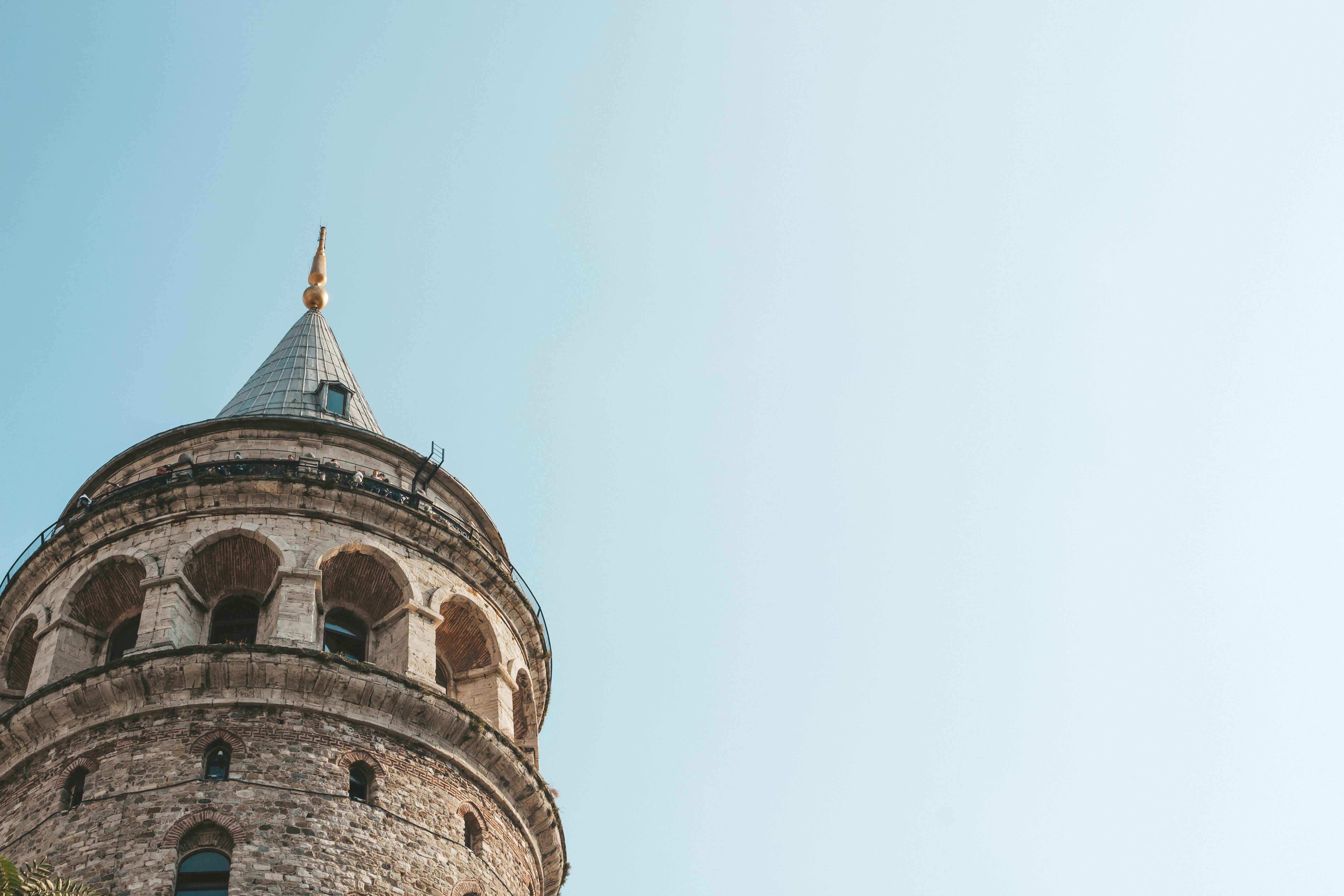 Low Angle Photography of Watch Tower · Free Stock Photo