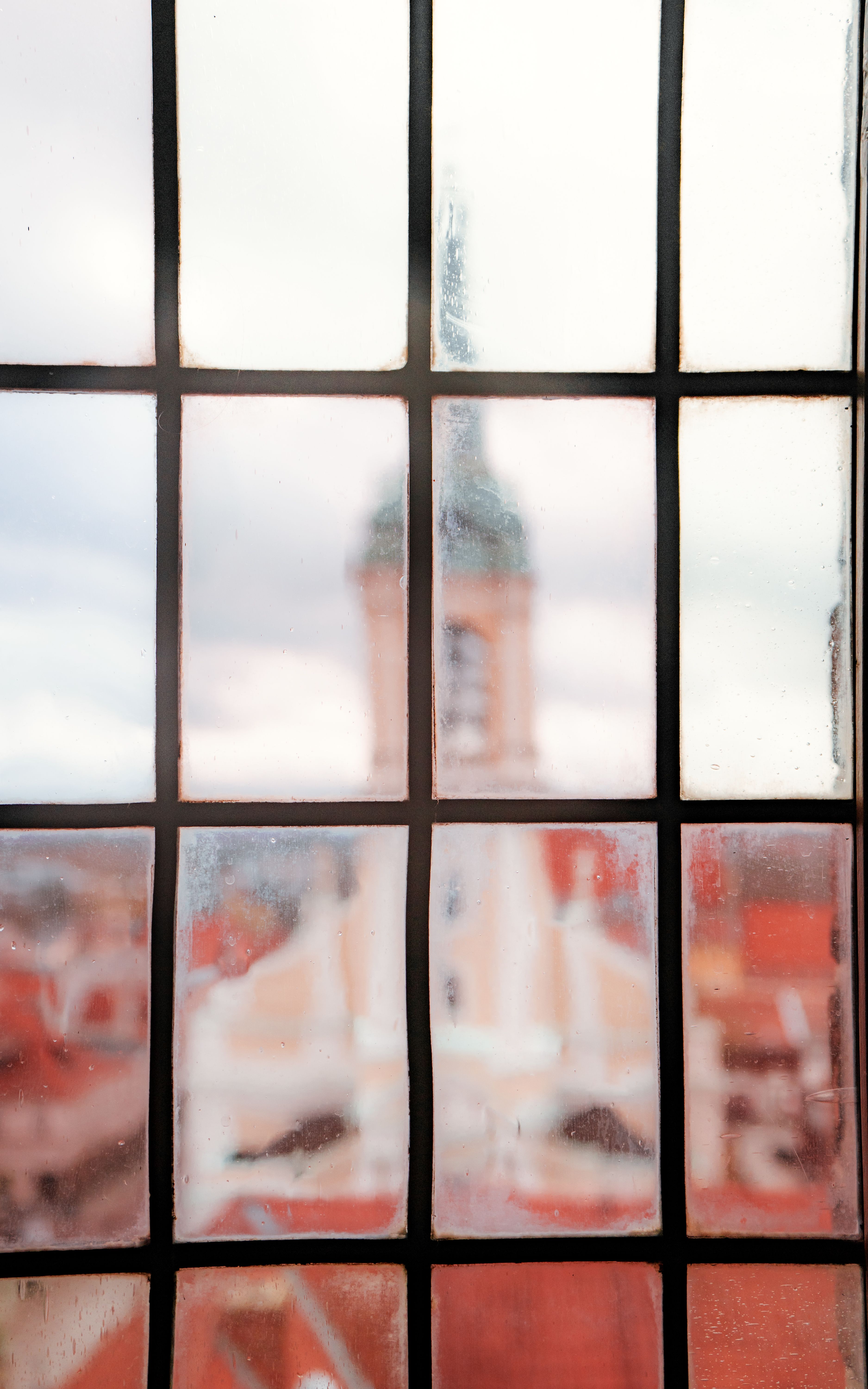 Church Tower Seen By the Window · Free Stock Photo