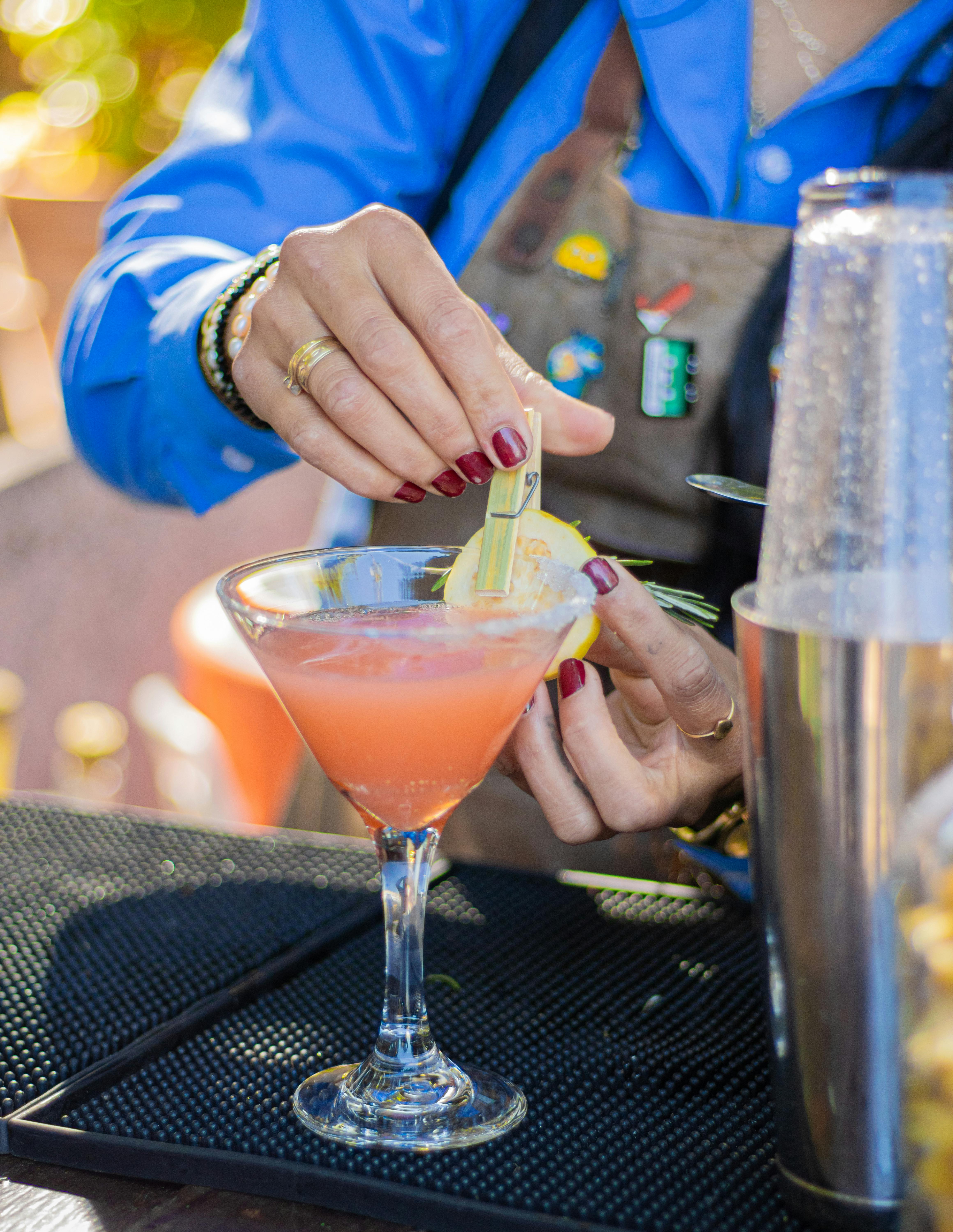 Woman Hands Holding Glass of Cocktail · Free Stock Photo