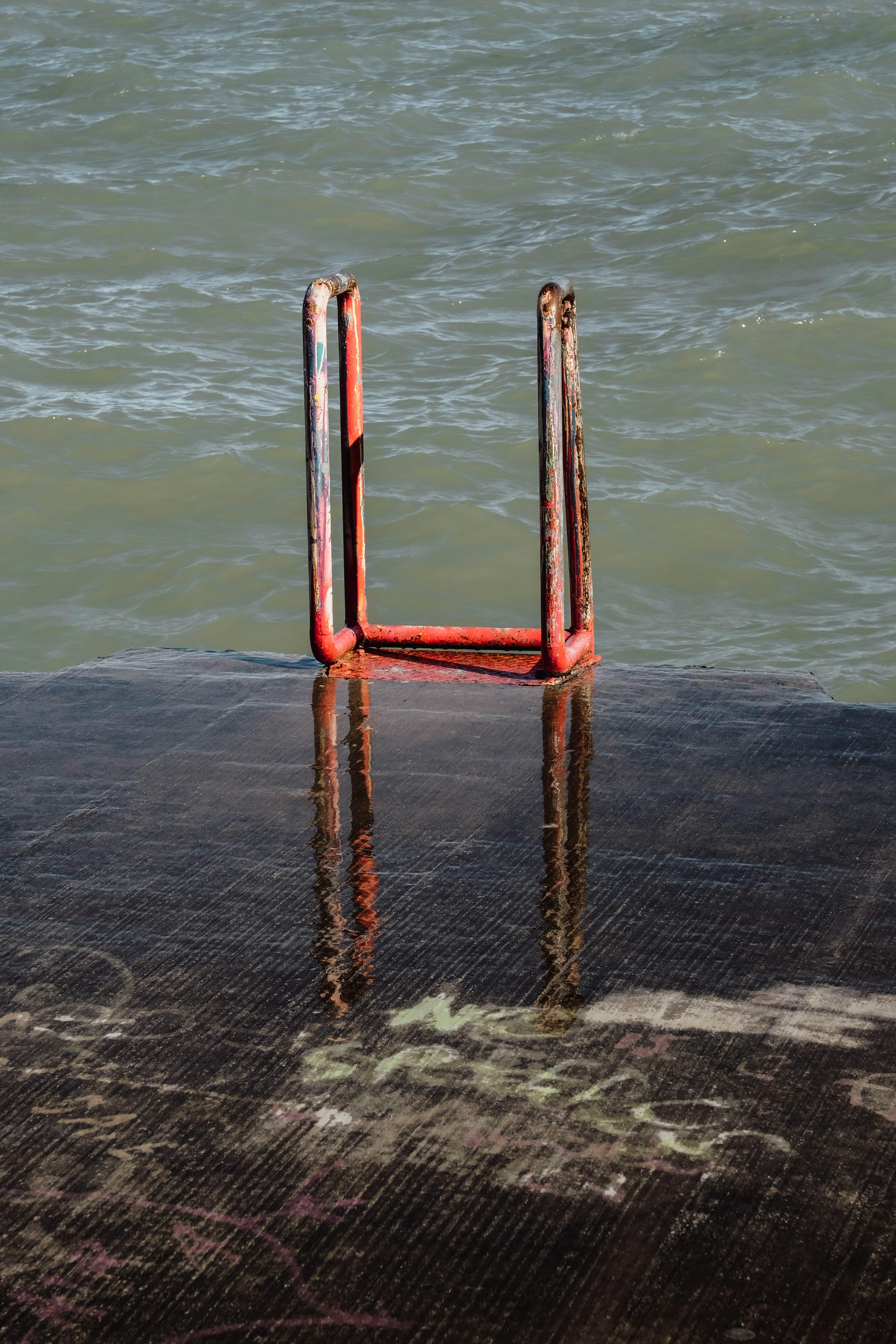 Ladder on Pier on Sea Shore · Free Stock Photo