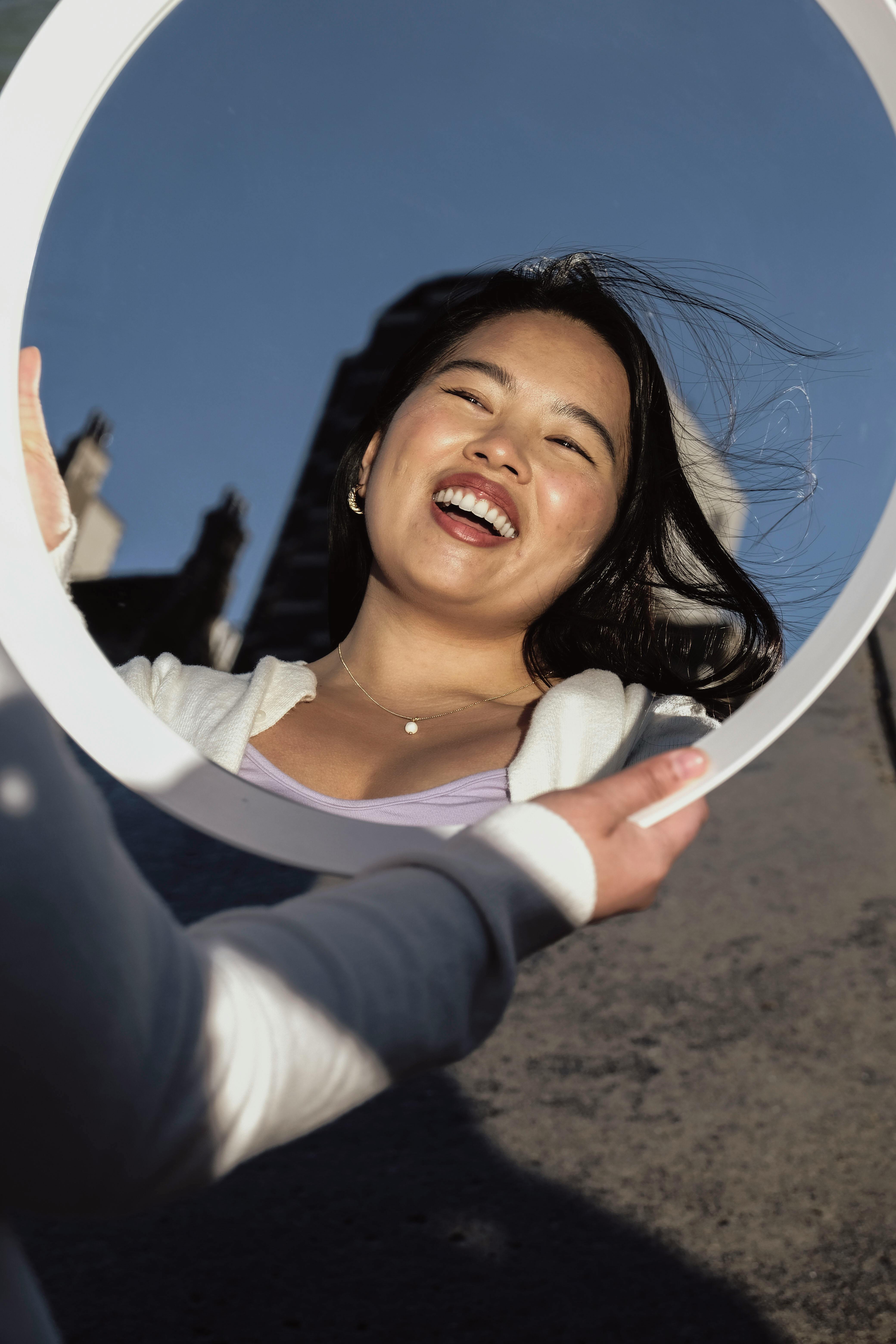 Smiling Woman Face Reflection in Mirror · Free Stock Photo
