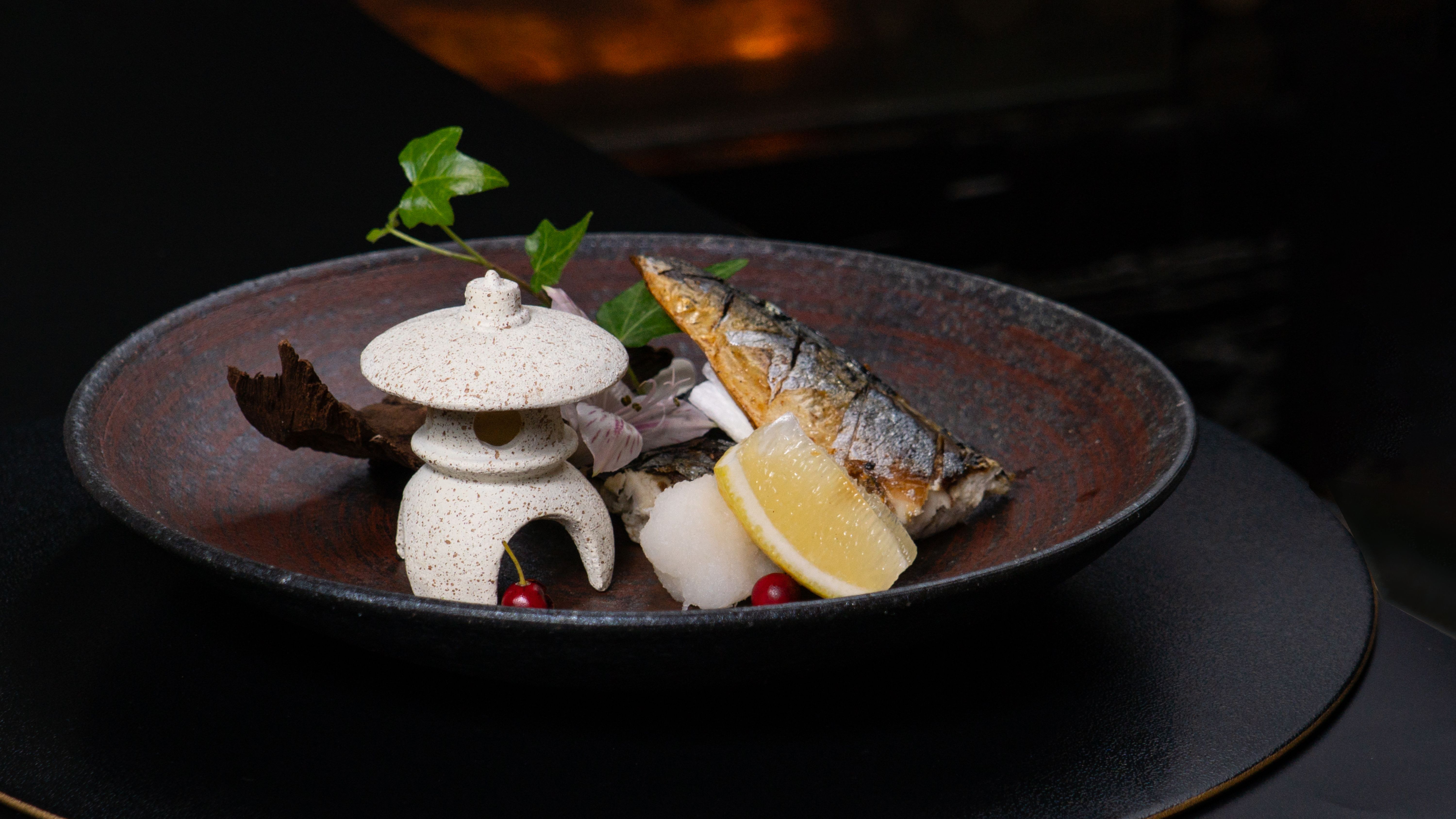 Close-up of a Gourmet Fish Dish Served in a Restaurant · Free Stock Photo
