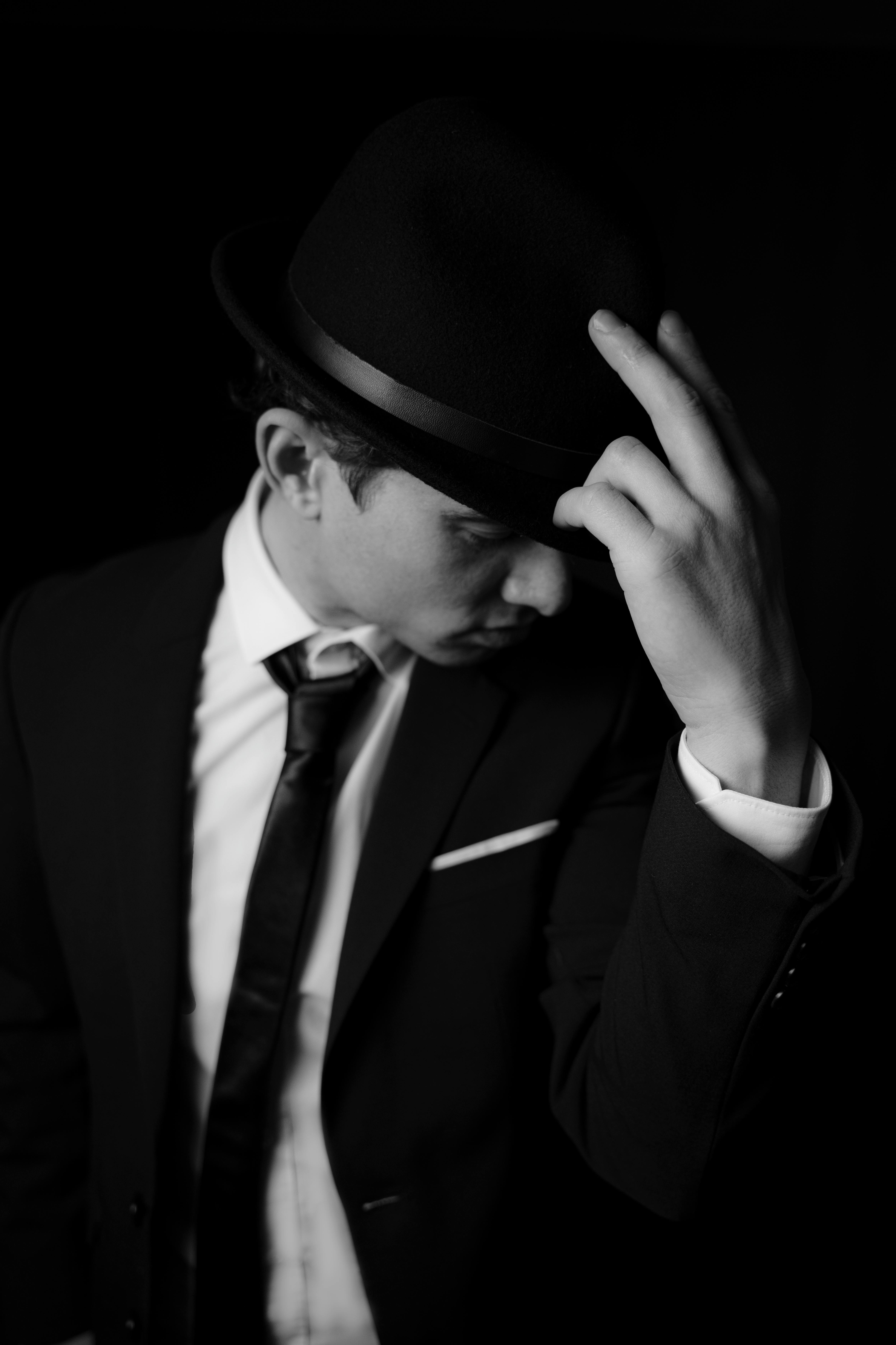 Elegant Man in Shadow in Black and White · Free Stock Photo