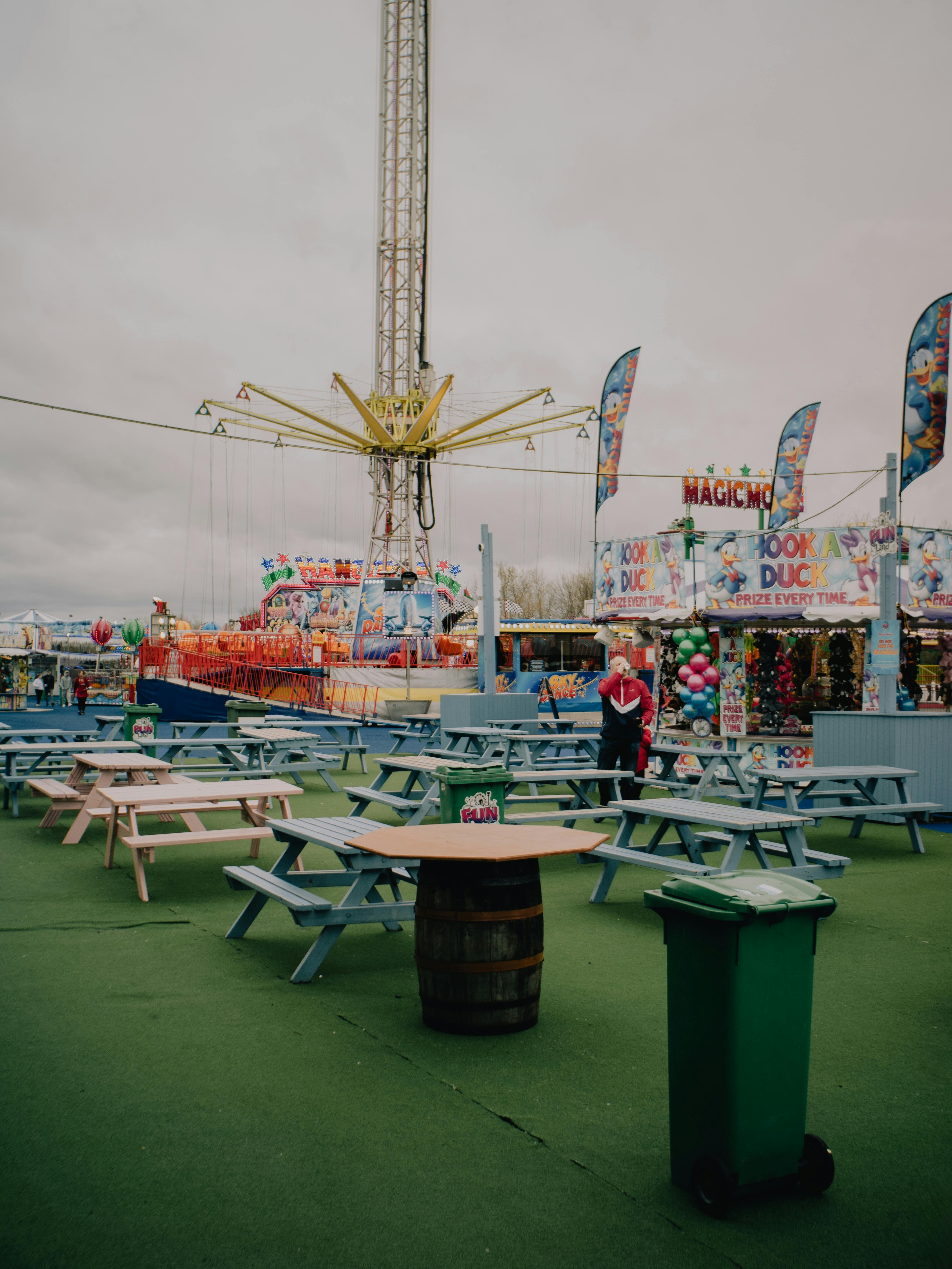 Tables and Benches in Amusement Park · Free Stock Photo