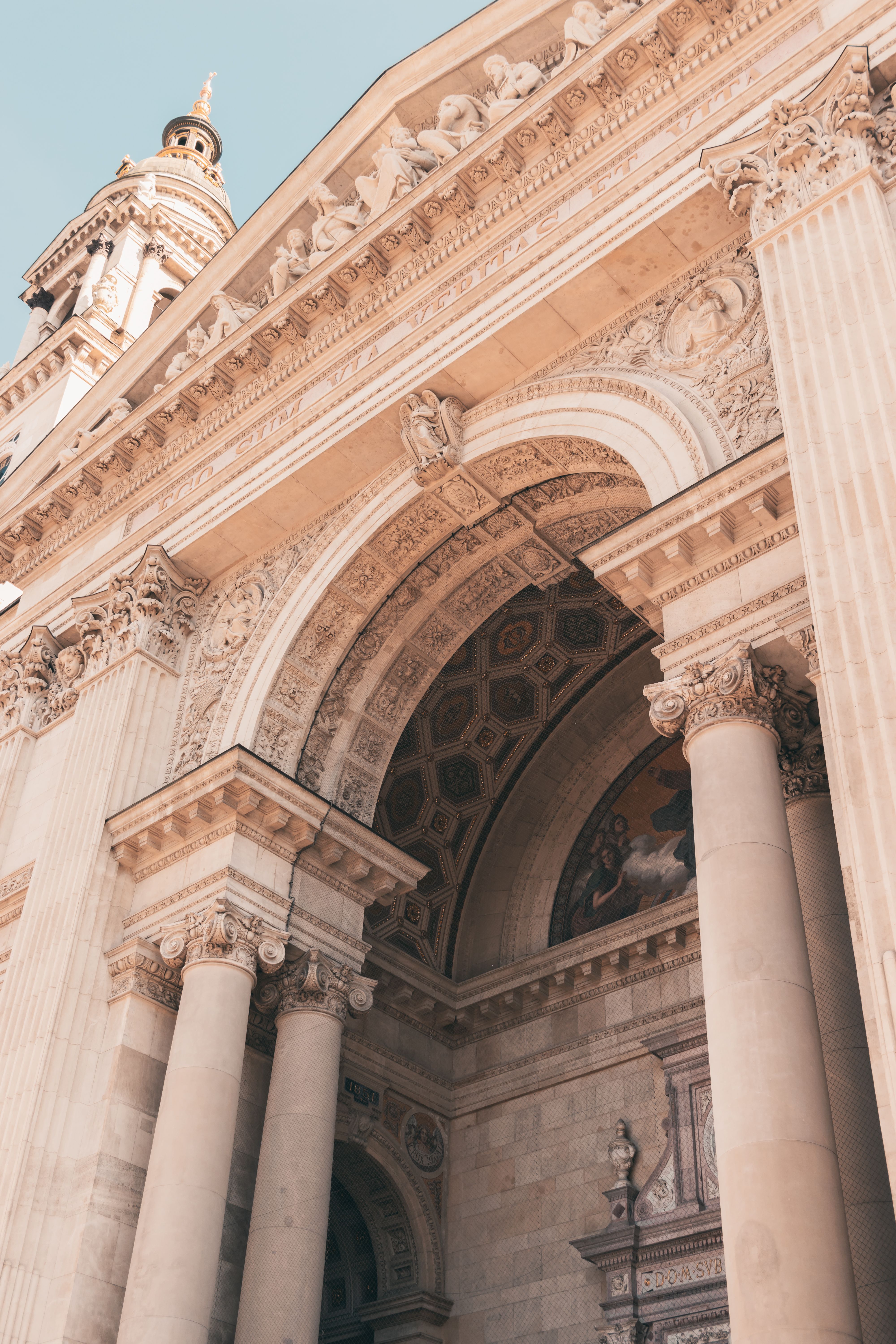 The front of a church with columns and pillars · Free Stock Photo