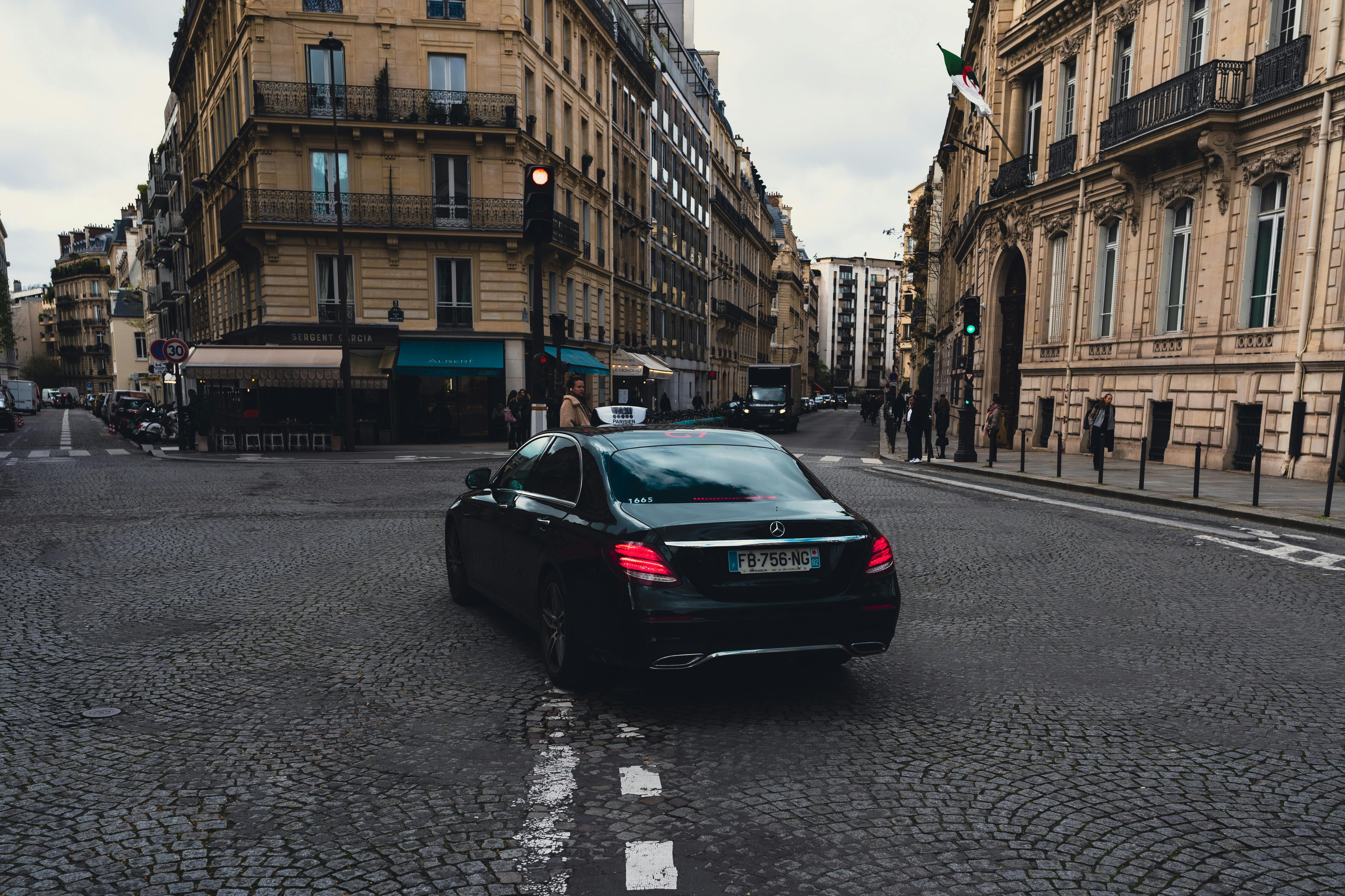 Black Mercedes-Benz E-Class Standing at a Red Light · Free Stock Photo