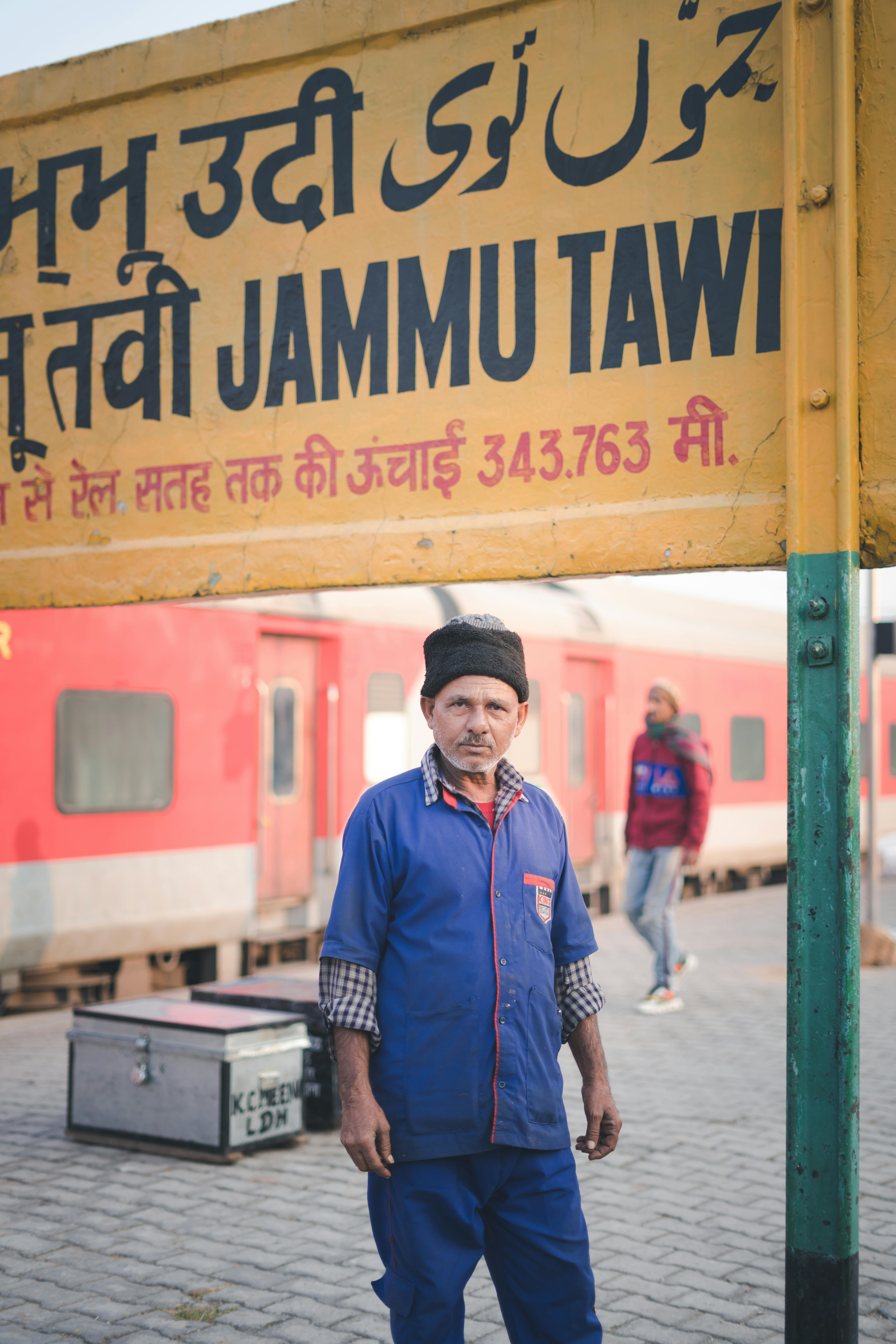 Railway Worker at Station · Free Stock Photo