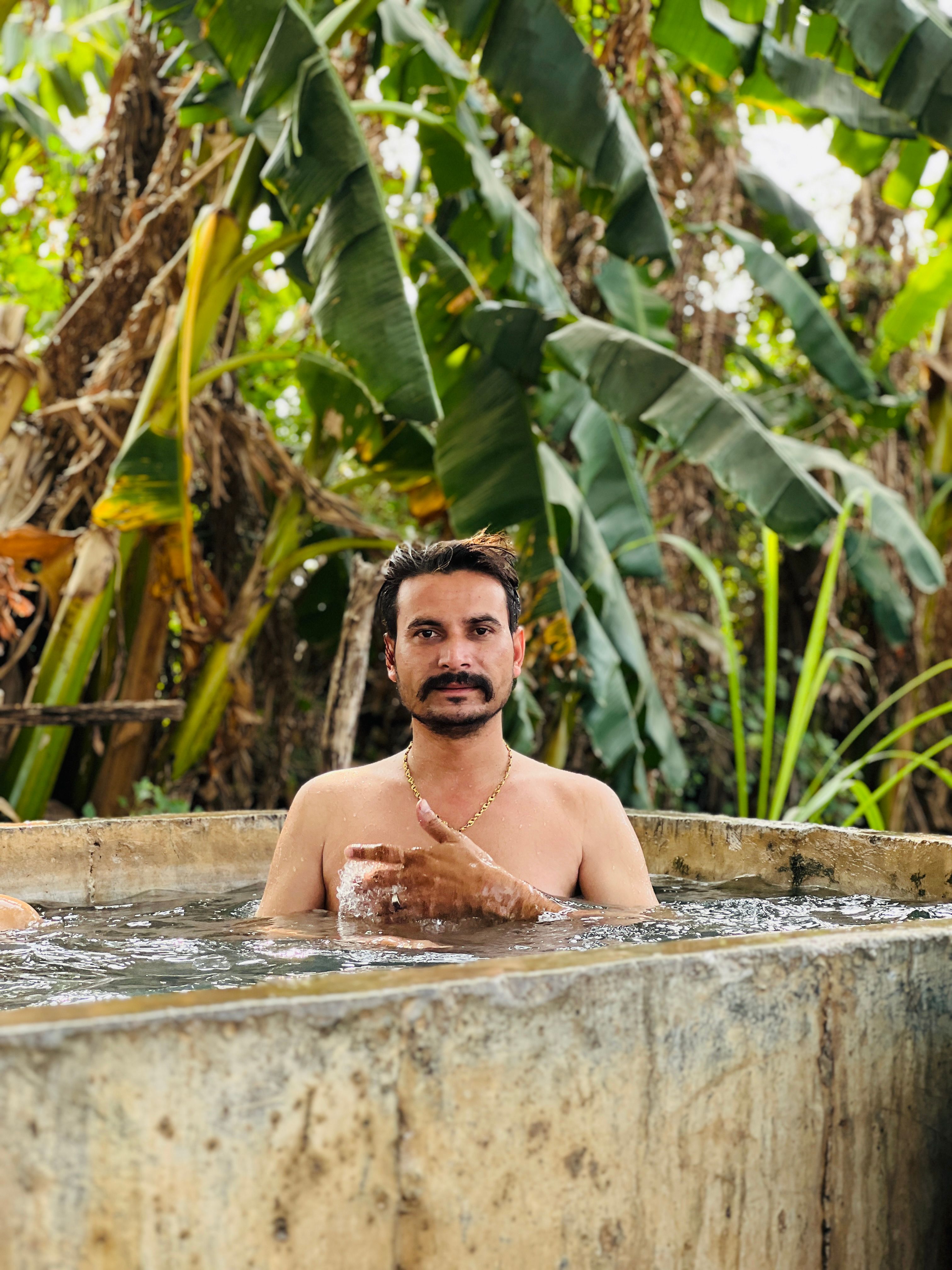 Man Taking Bath in Forest · Free Stock Photo